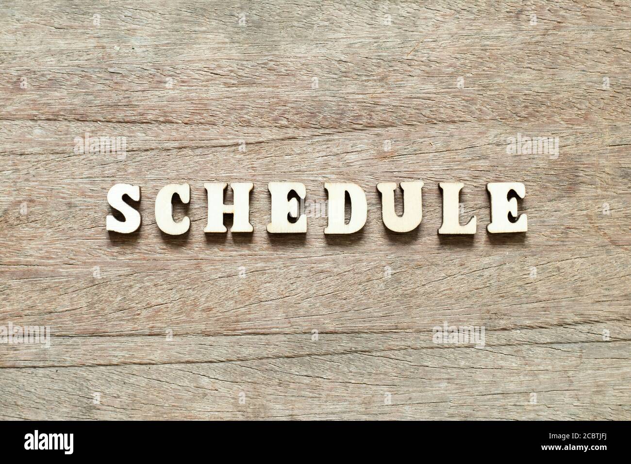 Alphabet letter block in word schedule on wood background Stock Photo ...