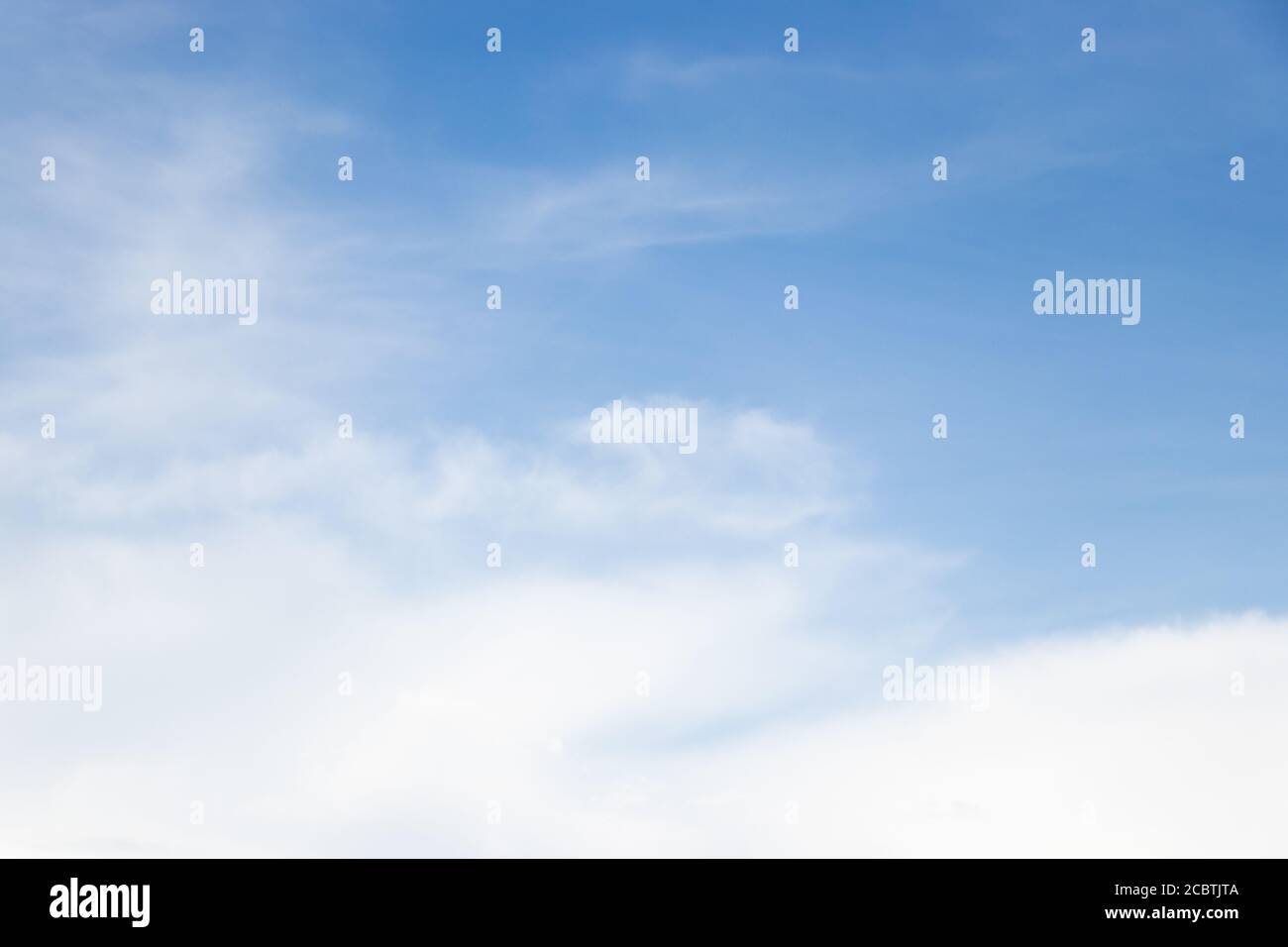 Clear blue color sky with white cloud background Stock Photo - Alamy