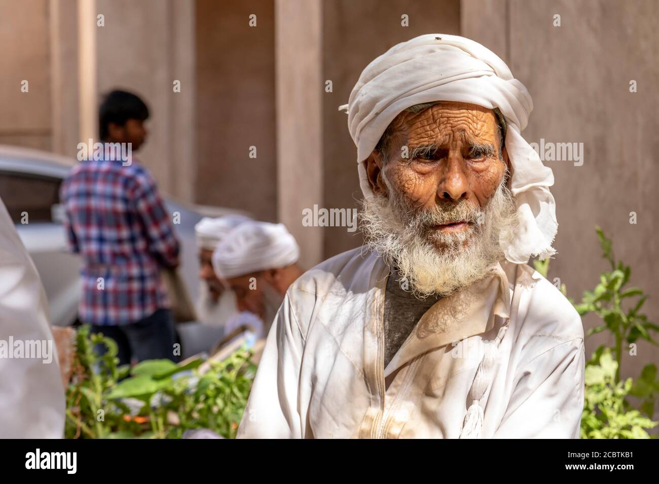 portrait of omani merchant attending the goat auction Stock Photo - Alamy