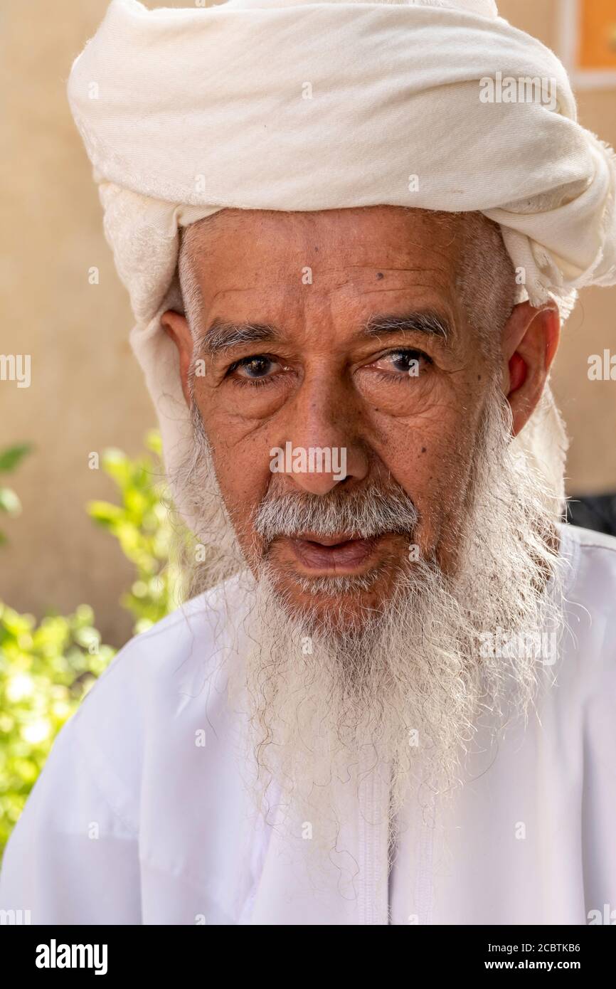 portrait of omani merchant attending the goat auction Stock Photo - Alamy