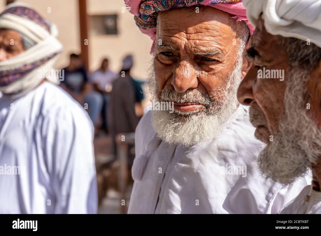portrait of omani merchant attending the goat auction Stock Photo - Alamy