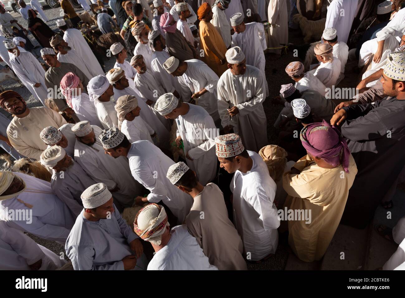Nizwa Friday markets busy goat auction Stock Photo - Alamy
