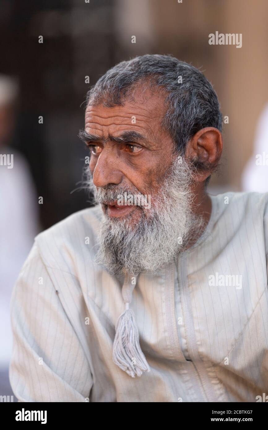 portrait of omani merchant attending the goat auction Stock Photo - Alamy