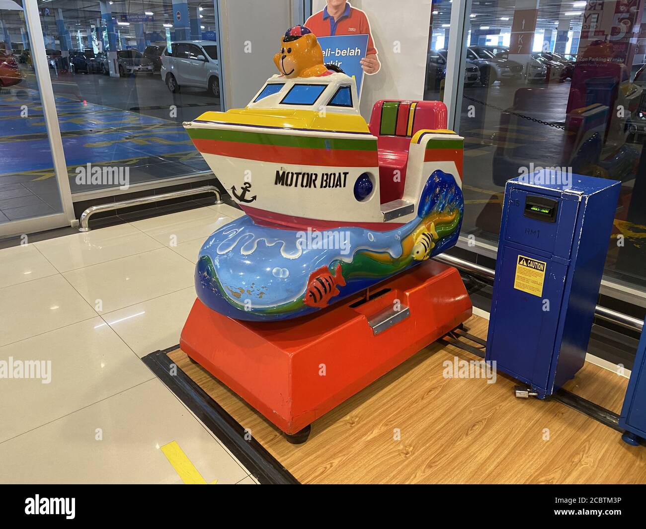 Penang, Malaysia - August 16, 2020 : View of a motor boat kiddie ride ...