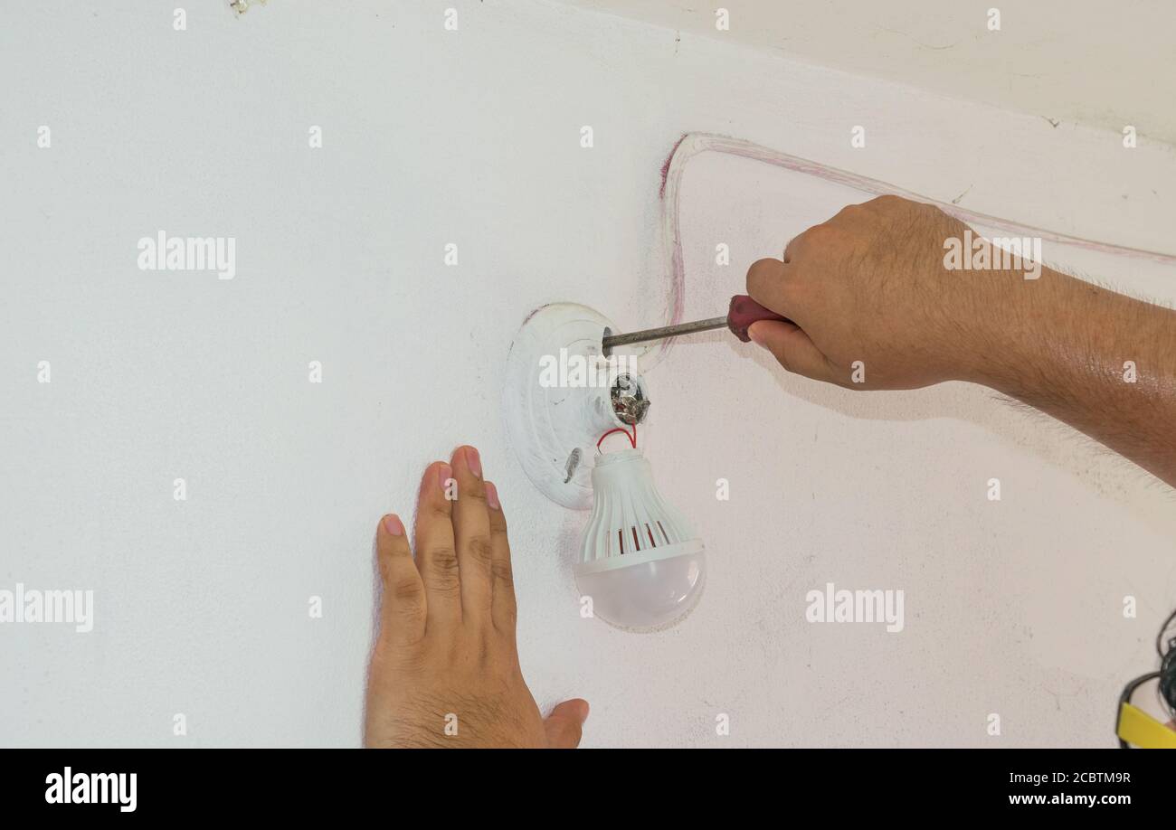 Electrician fixing electrical panel hi-res stock photography and images ...