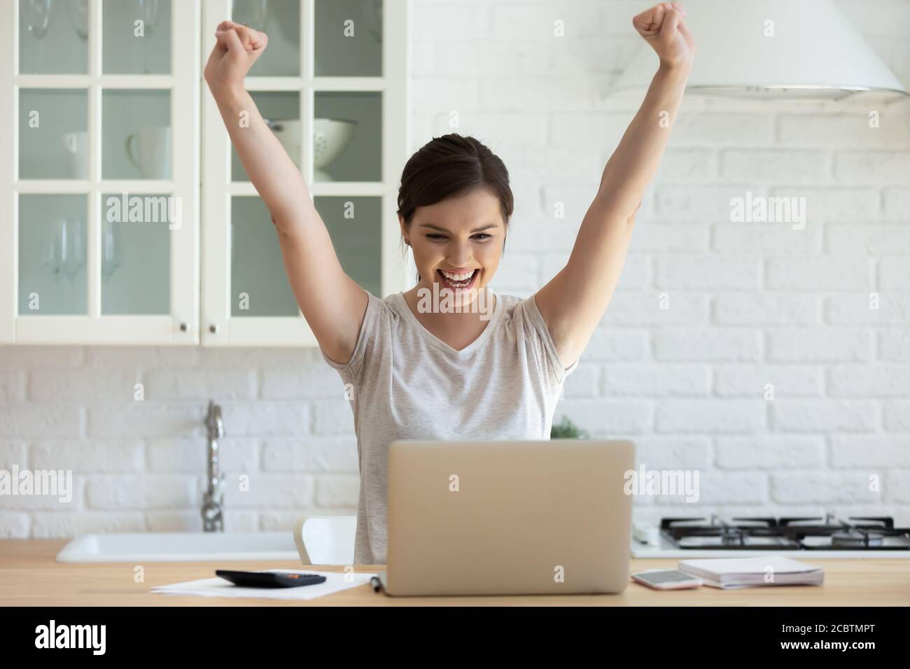 Female student is excited by email about perfect exam results Stock ...