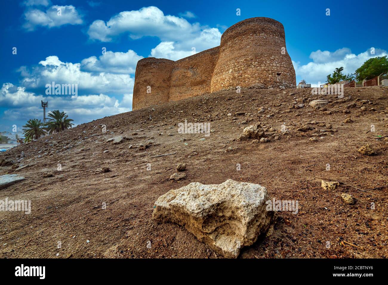 Tarout Castle, Qatif, Saudi Arabia in blue sky with clouds background ...