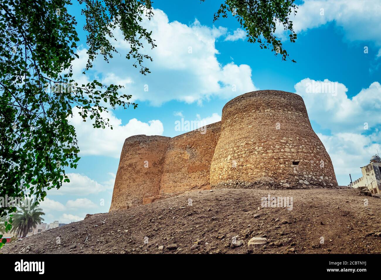 Tarout Castle, Qatif, Saudi Arabia in blue sky with clouds background ...