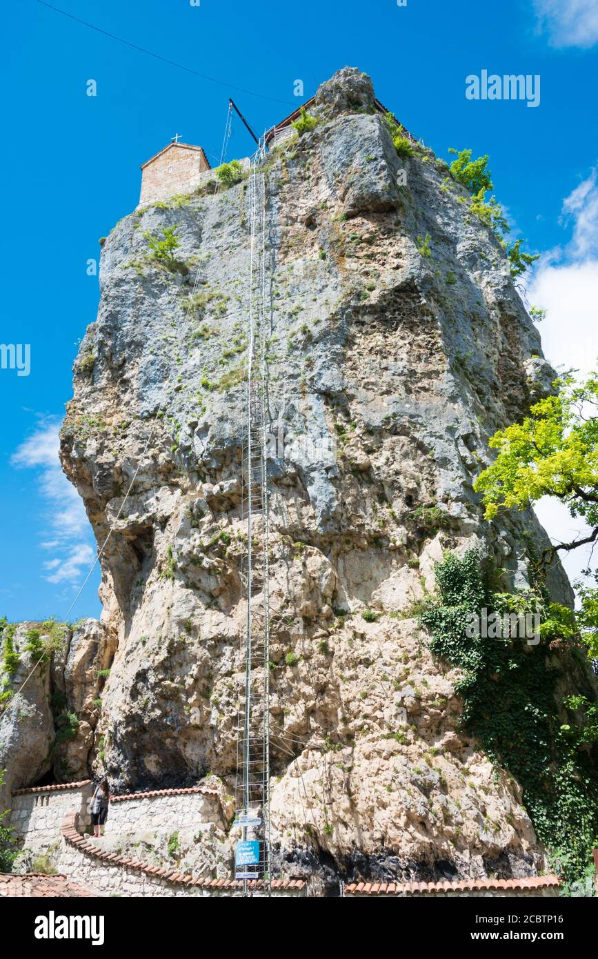 Katskhi pillar. a tall natural limestone monolith column with a ...