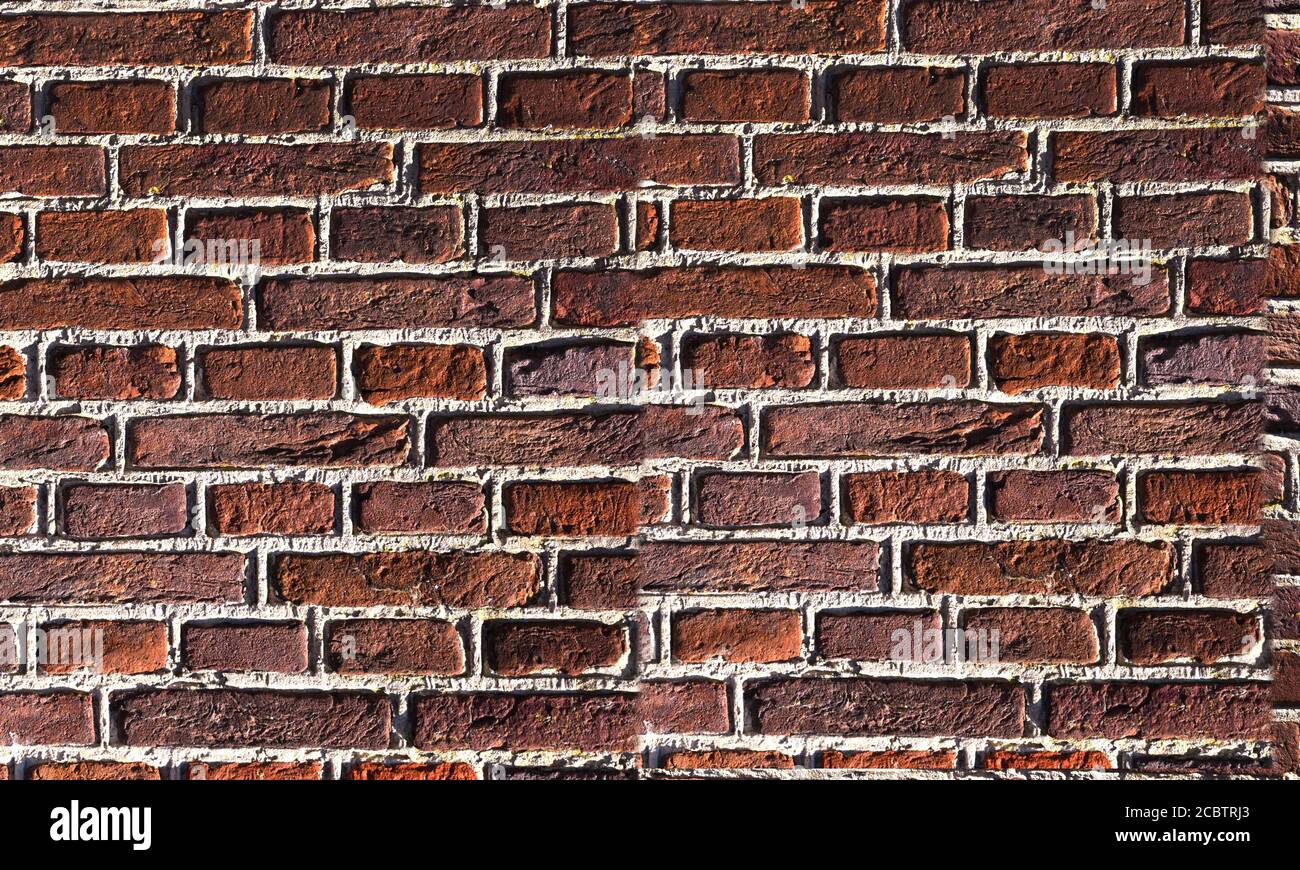 red brick wall stone bricks masonry Stock Photo - Alamy