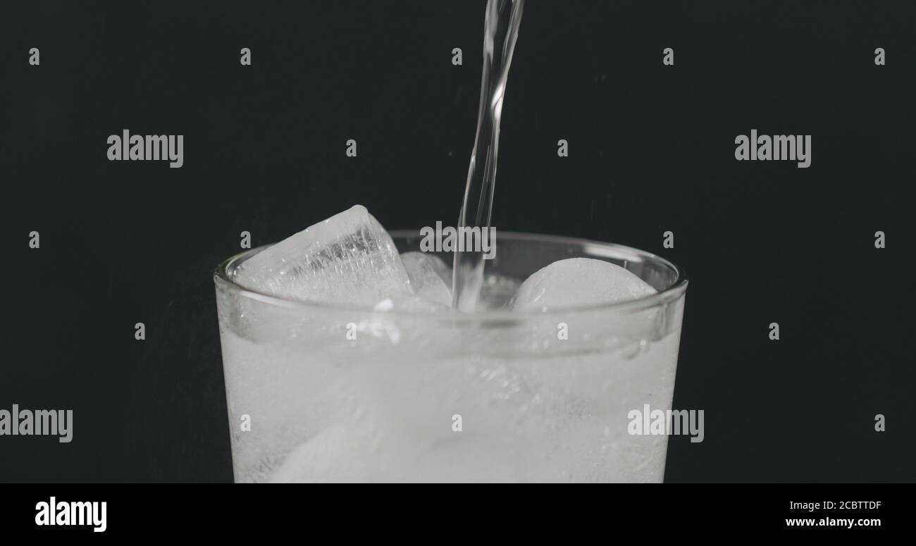 Pouring water glass slow motion hi-res stock photography and images - Alamy