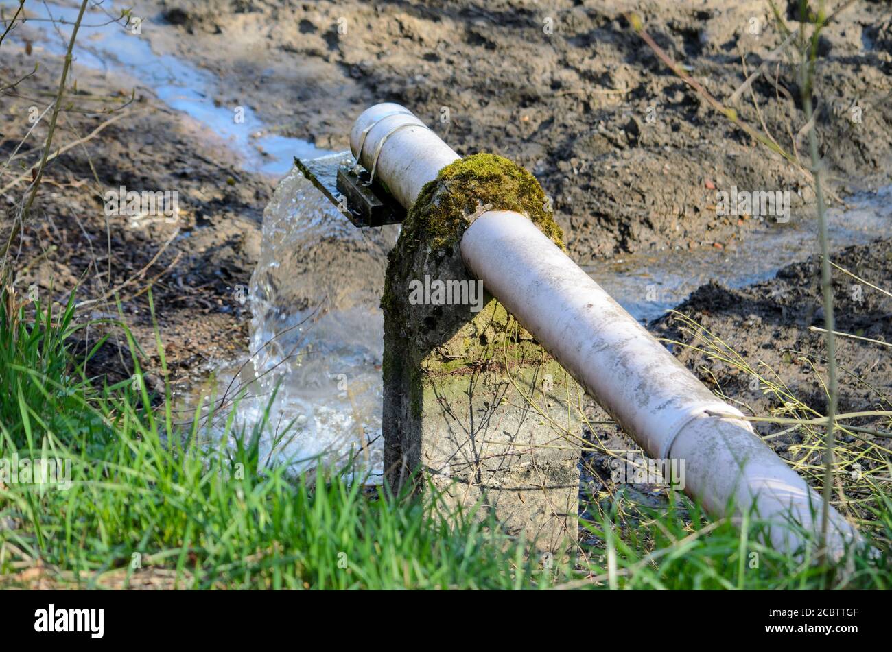 High angle shot of a water pipe in a rural area Stock Photo - Alamy