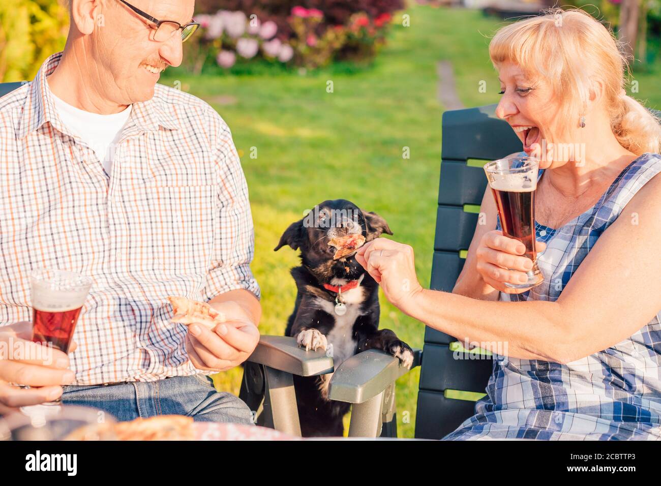 Old man dinner laughing woman hi-res stock photography and images - Alamy
