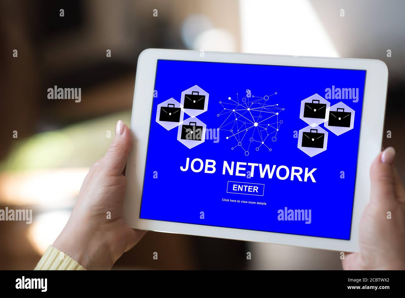 Tablet screen displaying a job network concept Stock Photo - Alamy