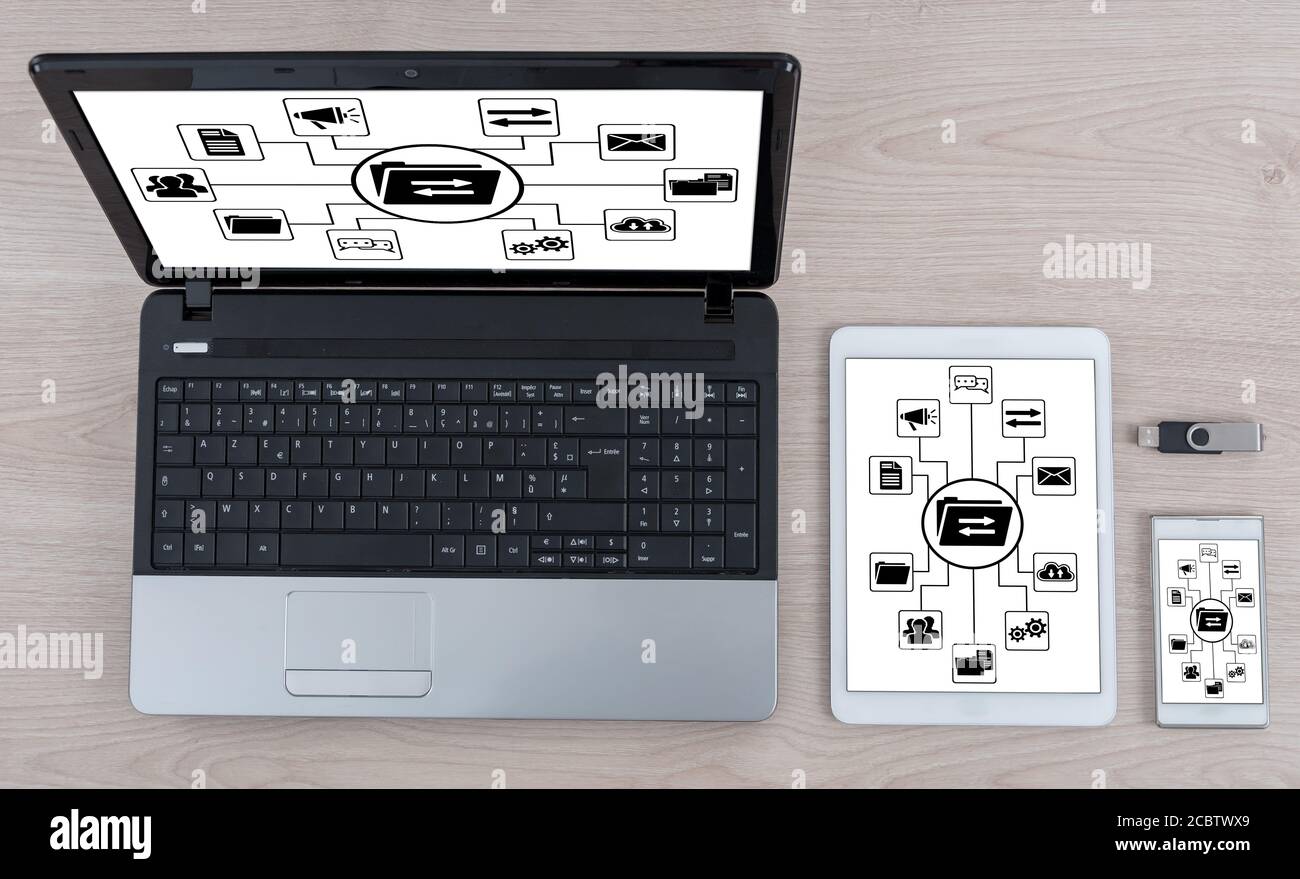 Data exchange concept shown on different information technology devices ...