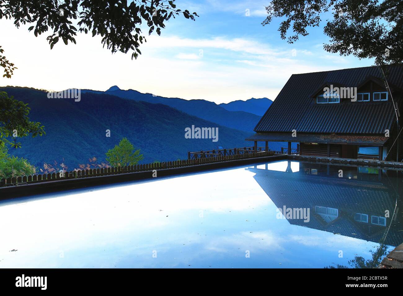 Beautiful dawn landscape with mountains and lake Stock Photo - Alamy