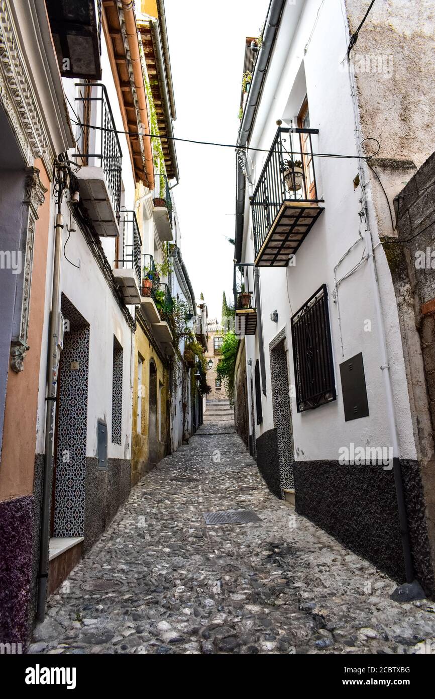 An alley in between residential buildings Stock Photo - Alamy