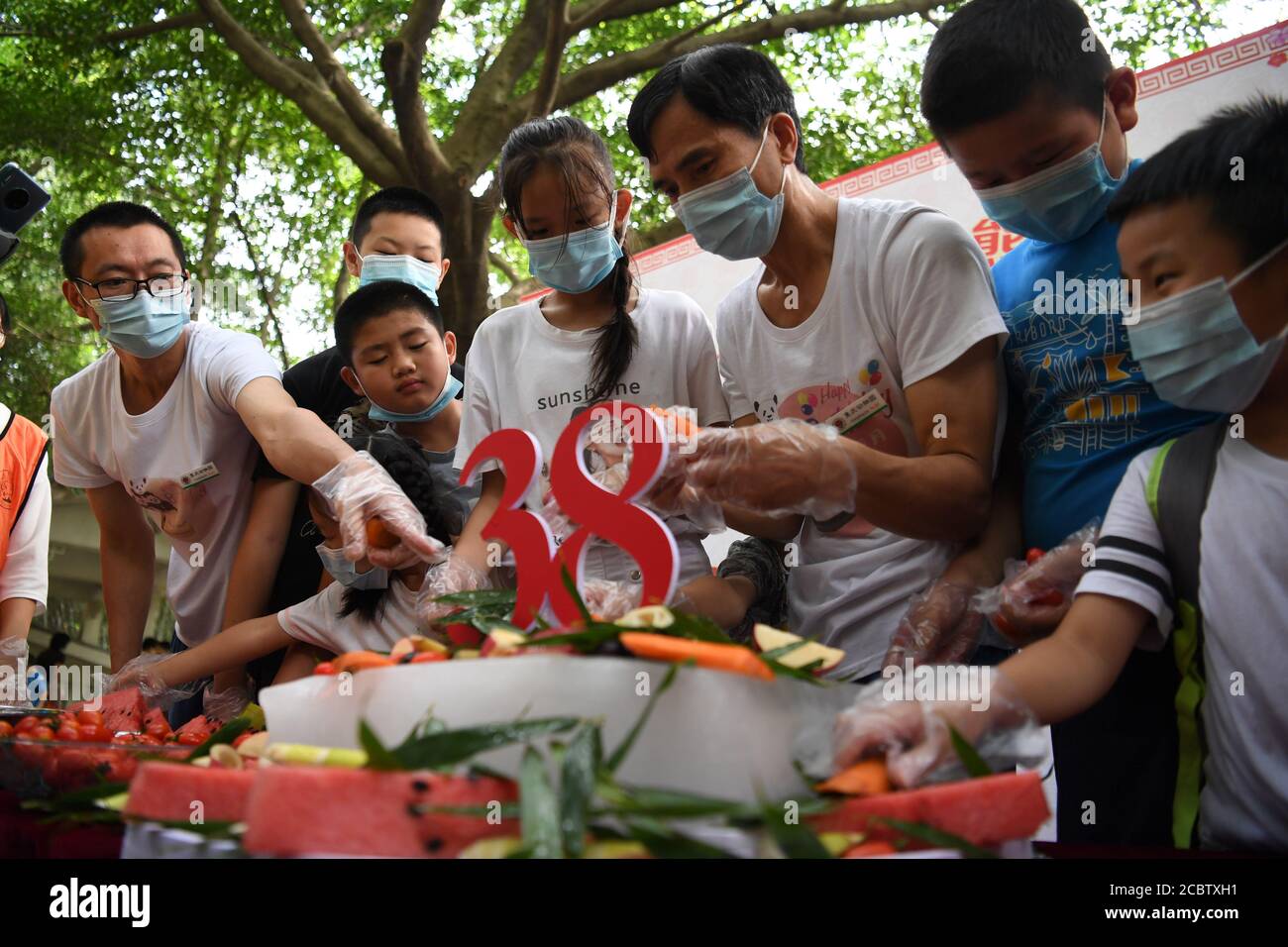 Chongqing. 16th Aug, 2020. People make a special birthday cake for ...