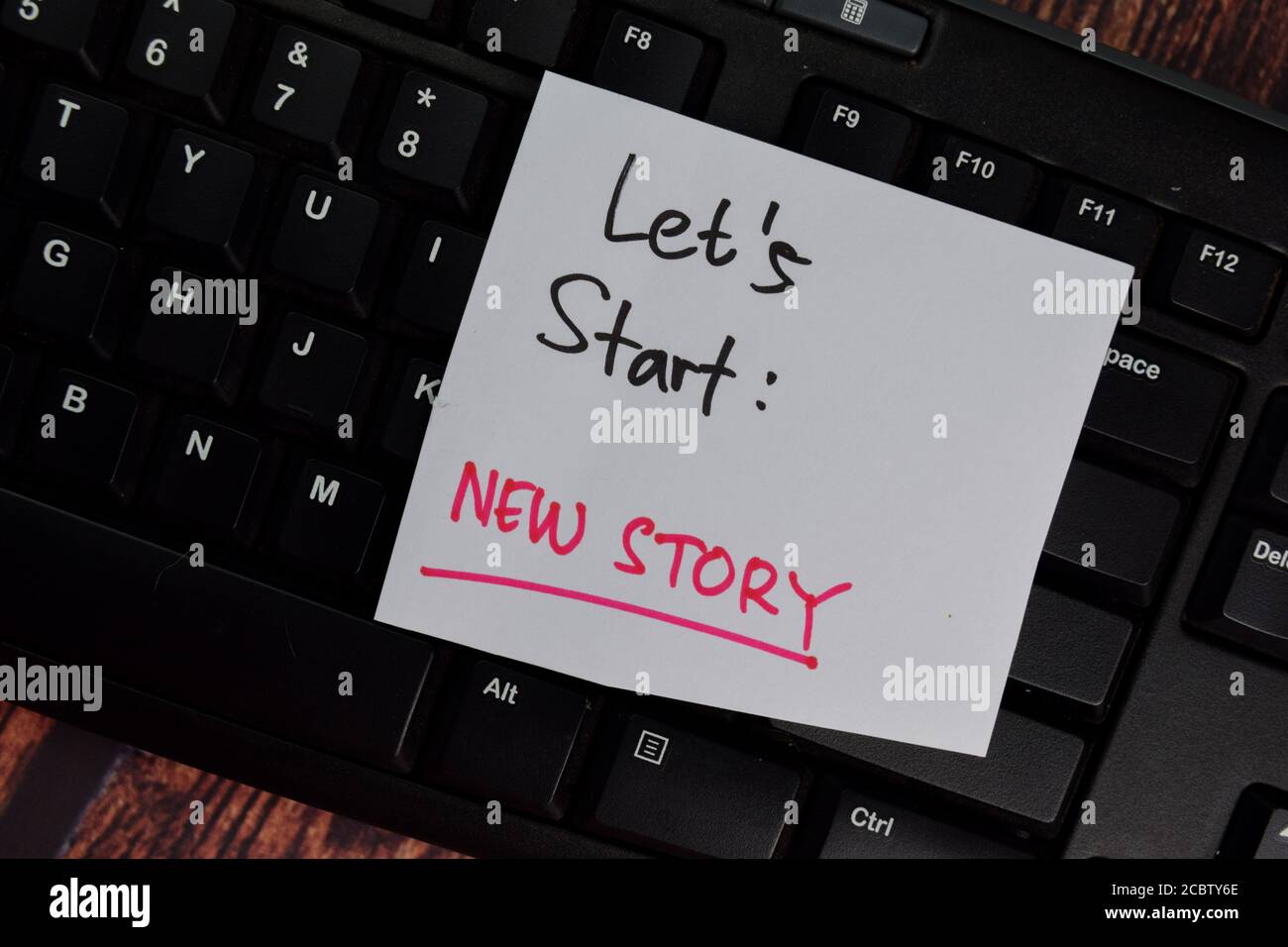 Let's Start - New Story text on sticky notes with office desk Stock ...