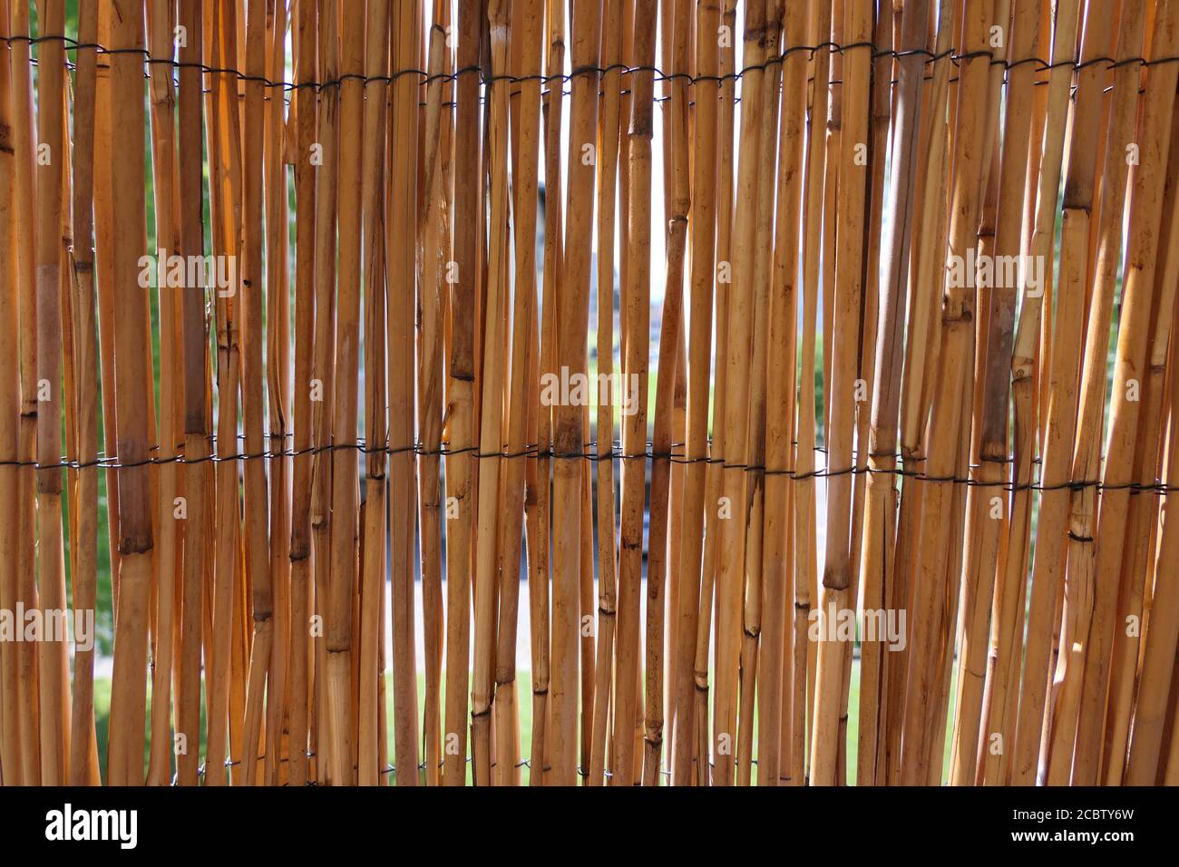 Bamboo wall as a brown wood texture Stock Photo - Alamy