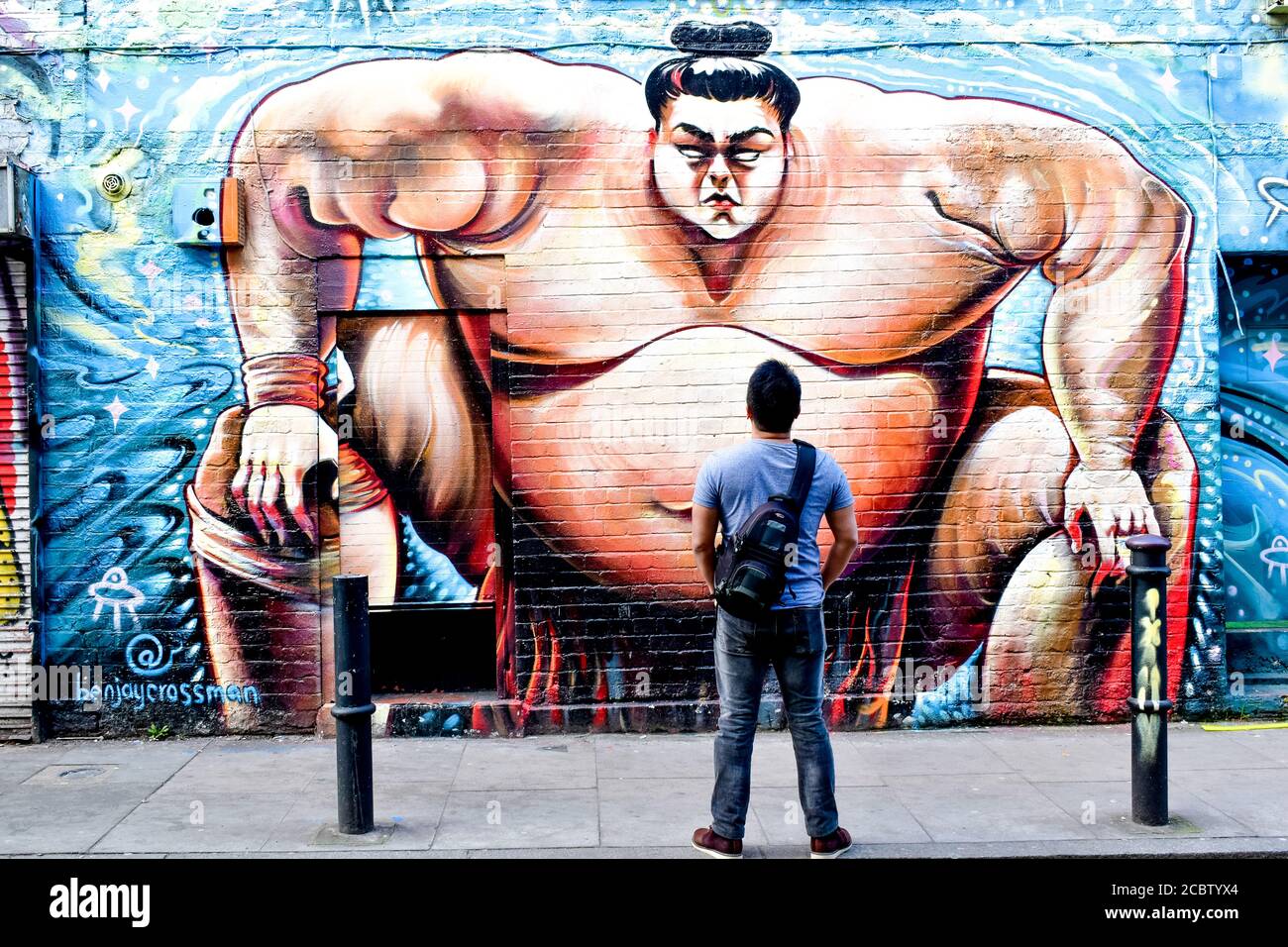 Graffiti of a sumo wrestler in Shoreditch Stock Photo - Alamy