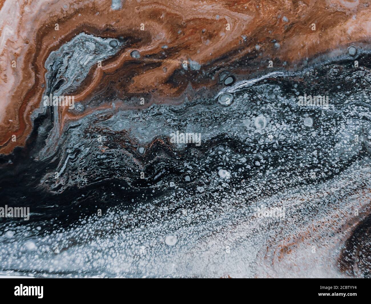 Colourful paint splattered on the paper Stock Photo - Alamy
