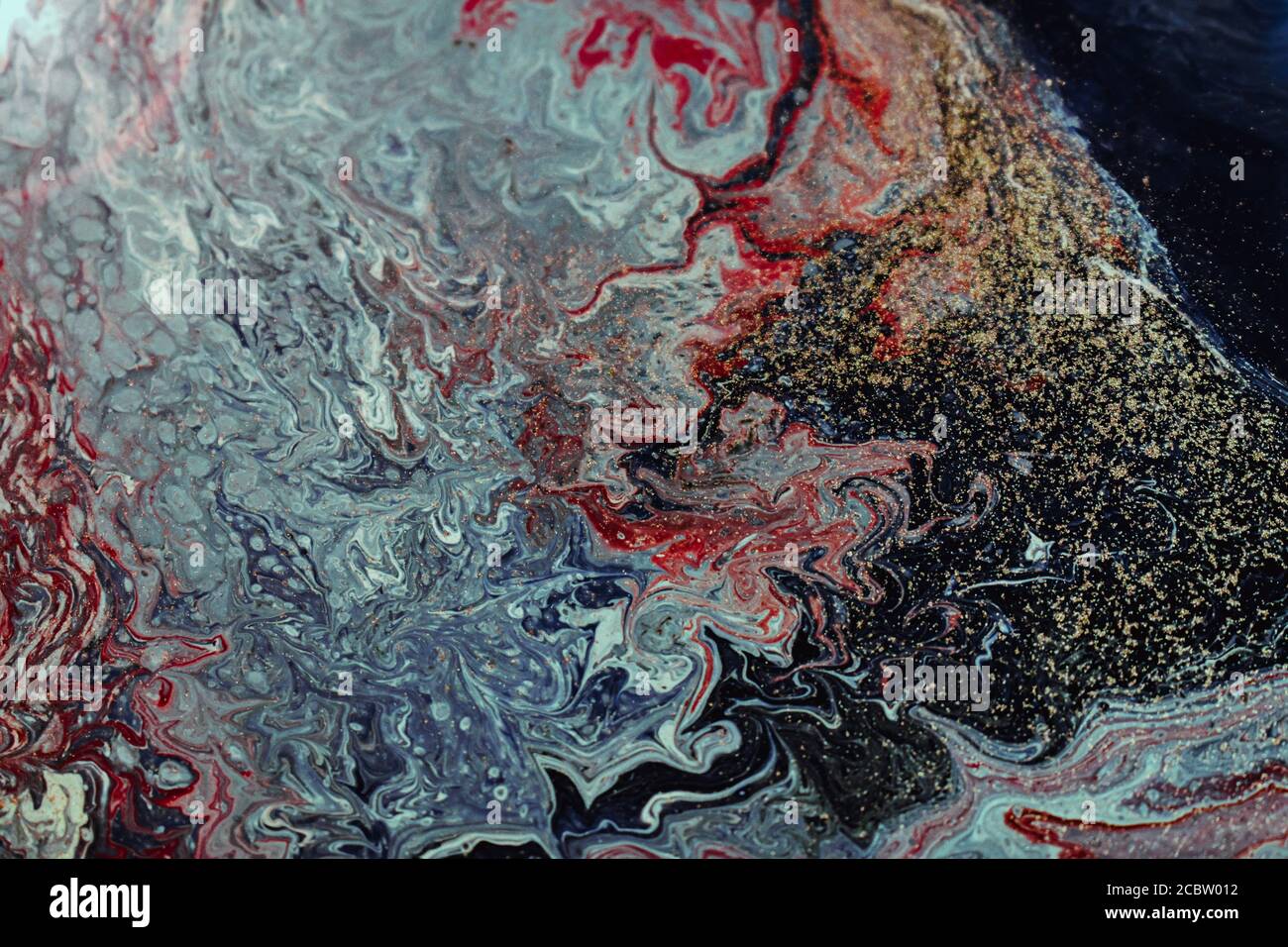 Colourful paint splattered on the paper Stock Photo - Alamy