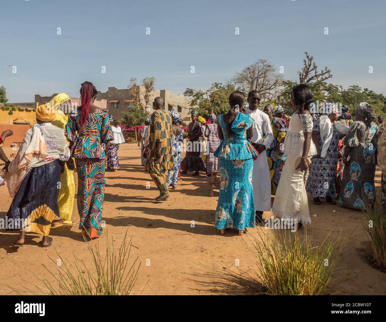 Senegal, Africa - January 2019: African people in colorful clothes ...