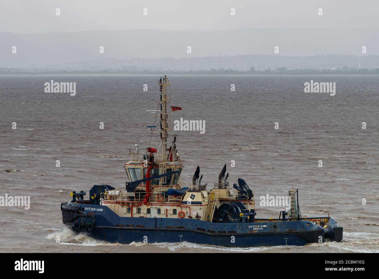 Tug heading out to Manon to bring her into Portbury docks Stock Photo ...