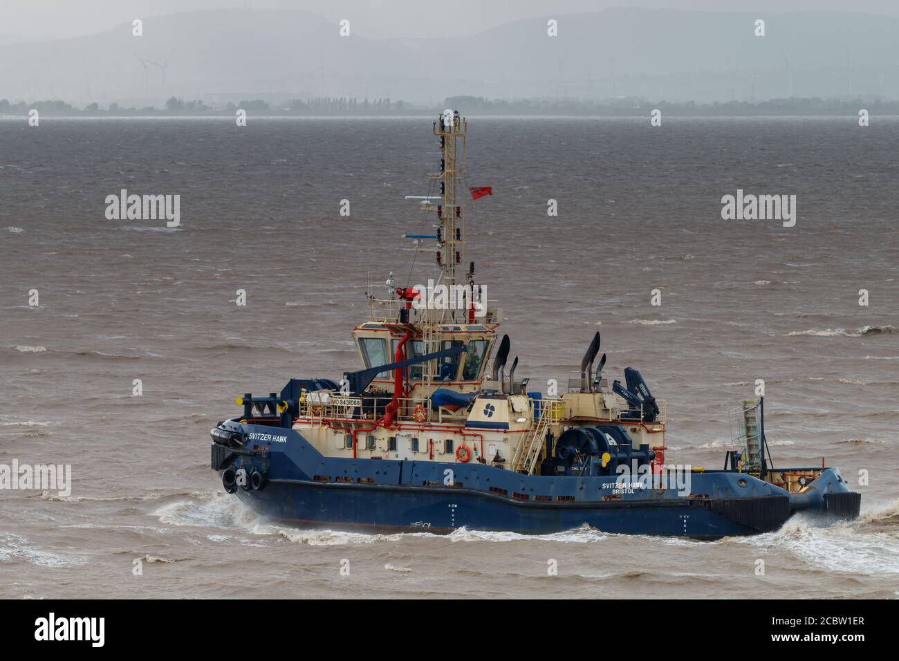 Tug heading out to Manon to bring her into Portbury docks Stock Photo ...