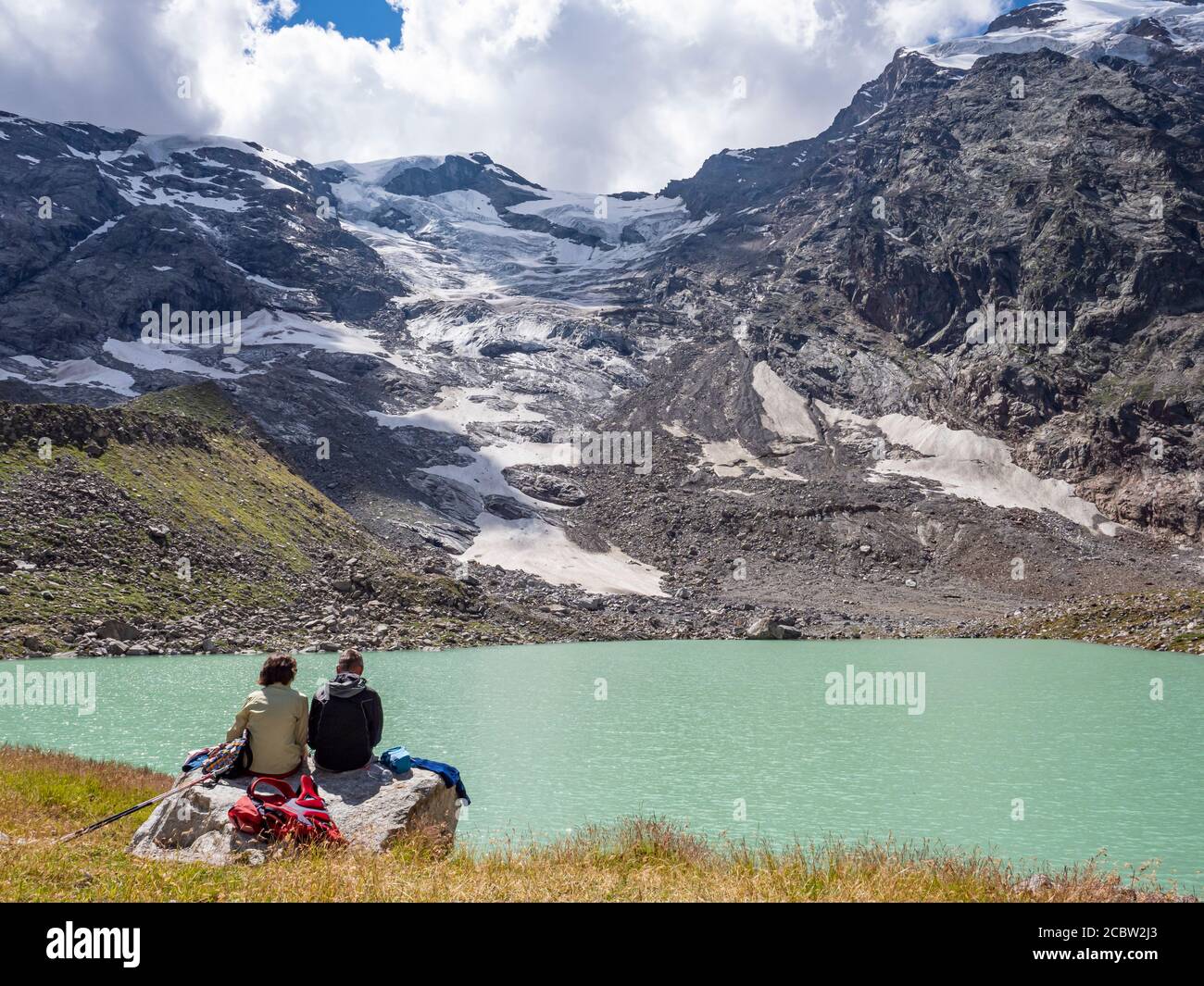 Trekking scene in the Italian alps Stock Photo - Alamy