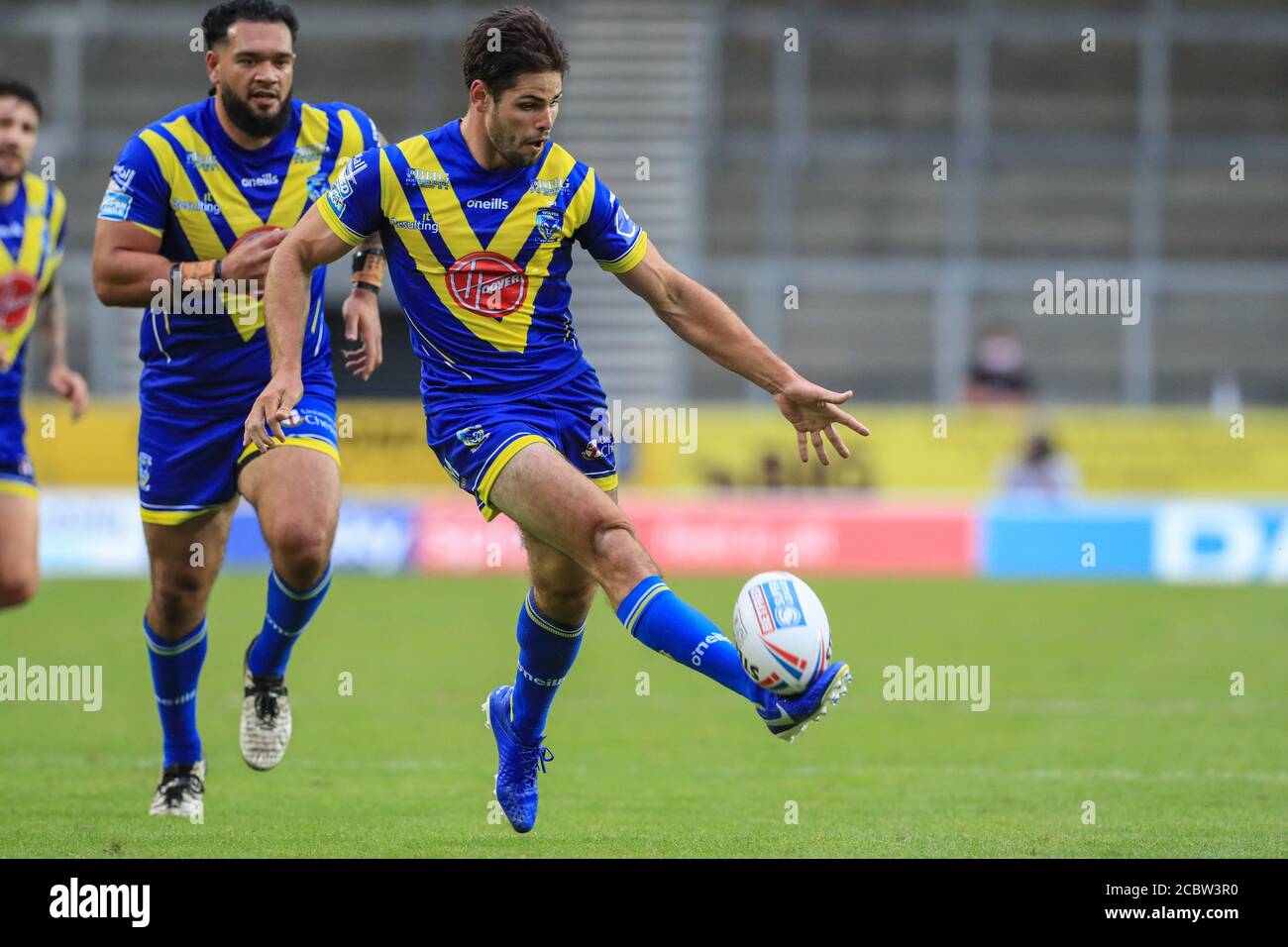 Jake Mamo (17) of Warrington Wolves kicks the ball towards the goal ...