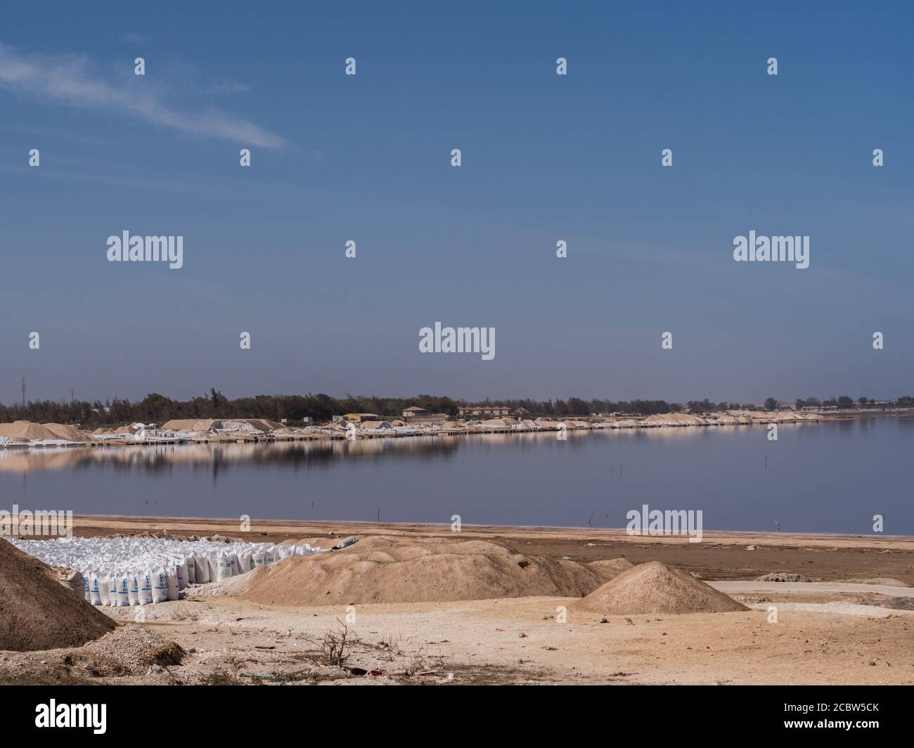 View of Lac Rose (meaning Pink Lake). Lake Retba with the red water is ...