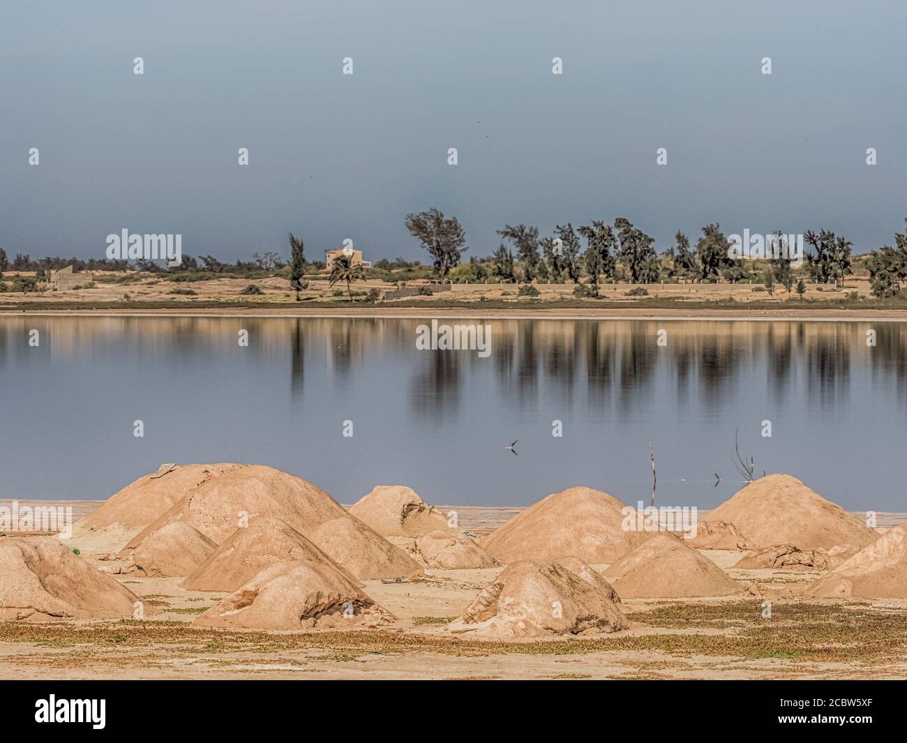View of Lac Rose (meaning Pink Lake). Lake Retba with the red water is ...