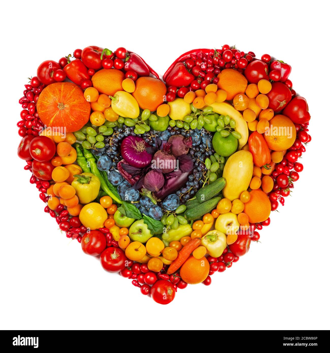 Rainbow heart of fruits and vegetables studio isolated on white ...