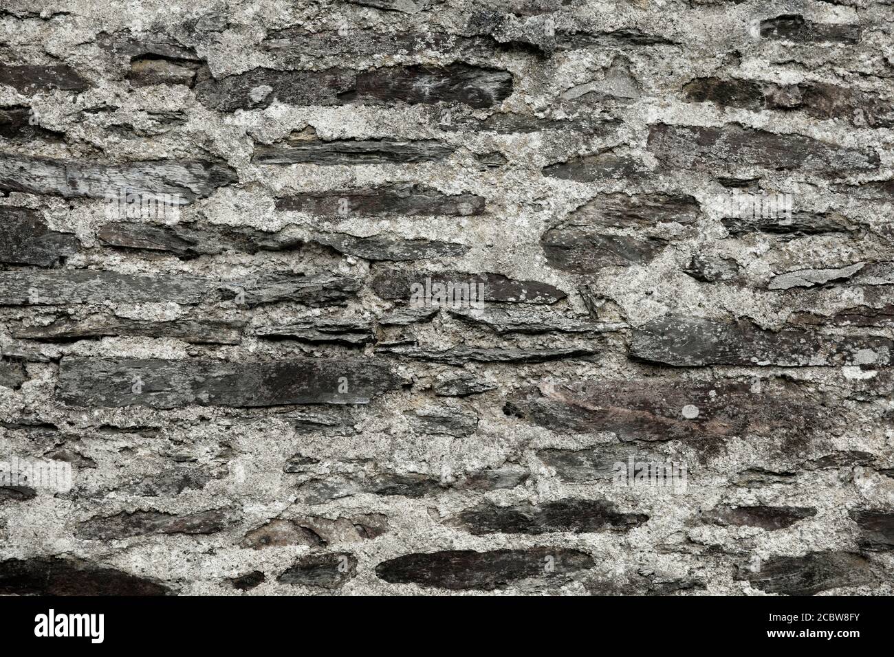 A stone wall texture background from a farmhouse Stock Photo - Alamy