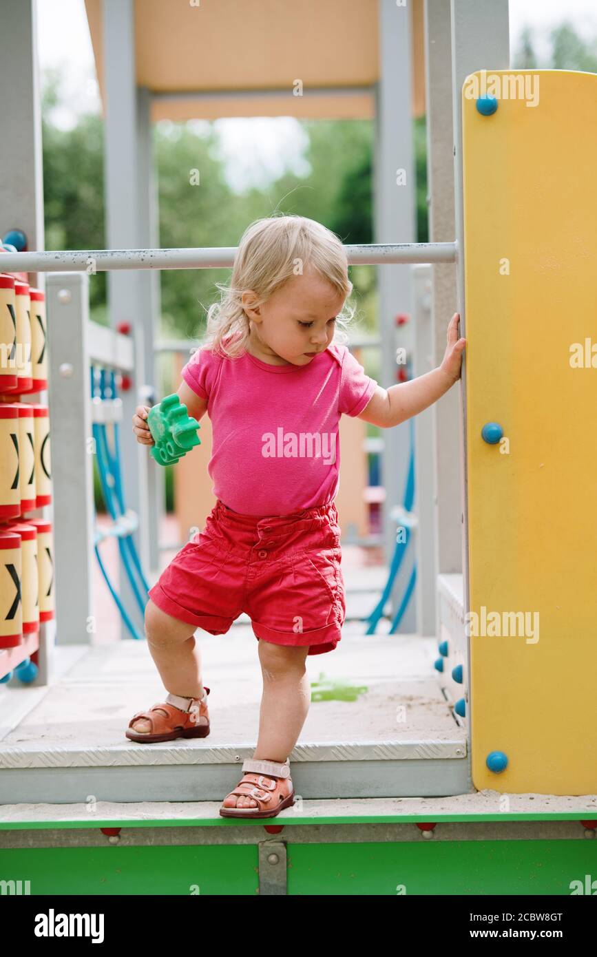 baby girl on the child playground Stock Photo - Alamy
