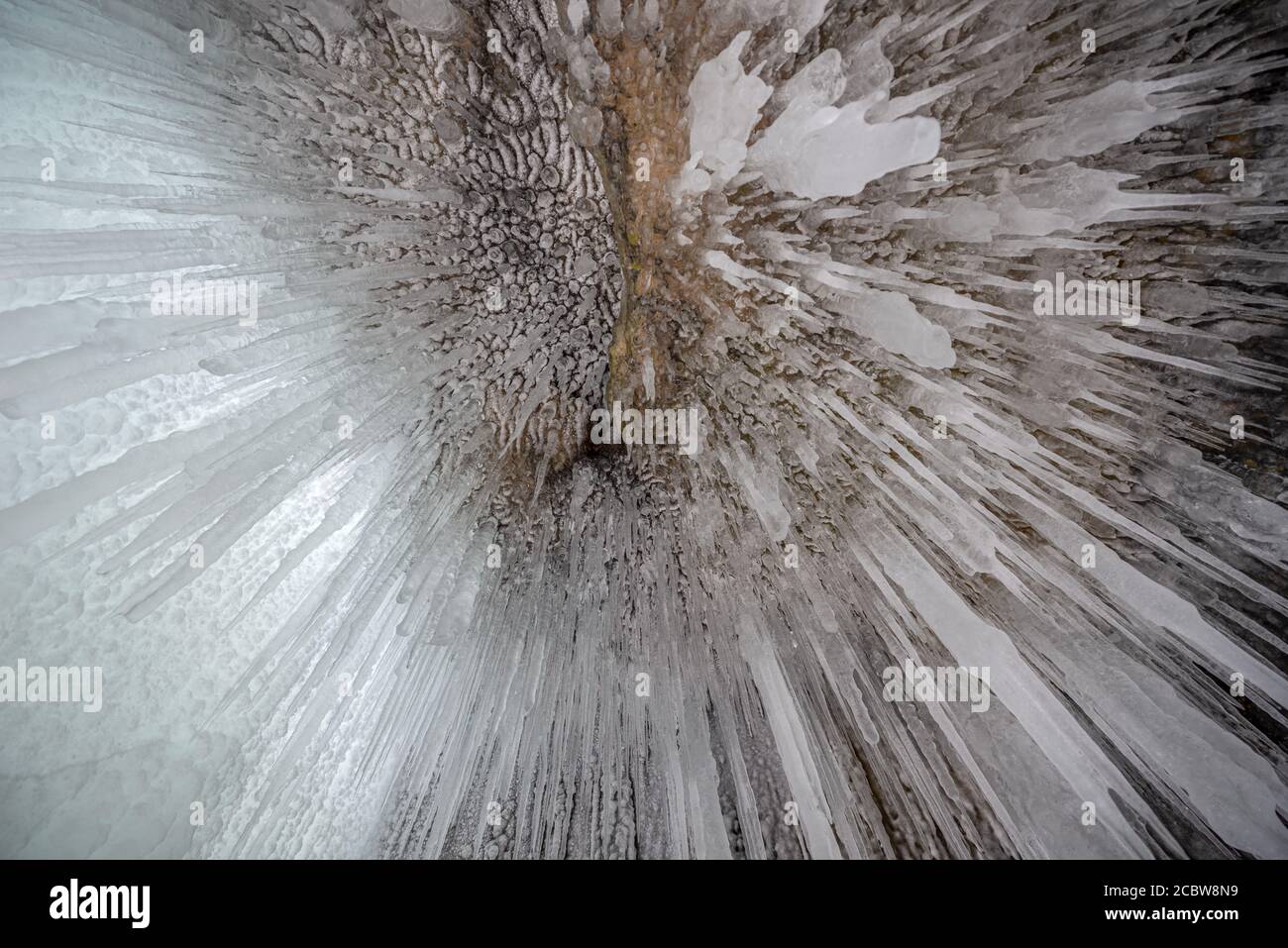 Stalactites hanging from the ceiling of an ice cave at Lake Baikal ...