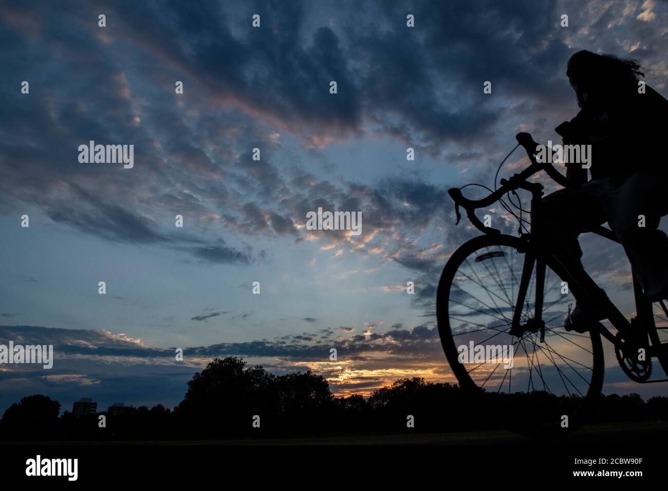 Man riding on a boris bike hi-res stock photography and images - Alamy