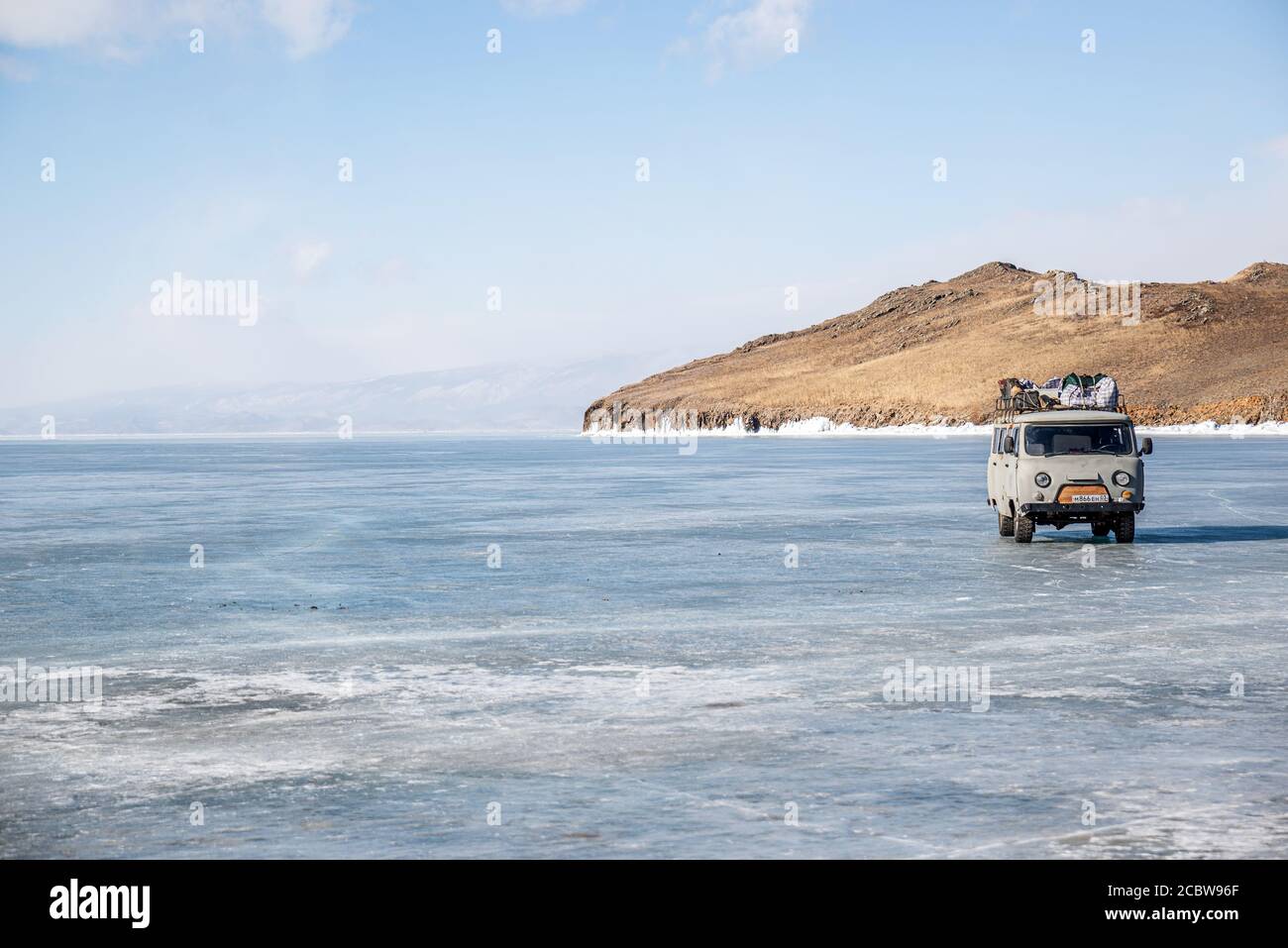 UAZ 452 van on the frozen surface of Lake Baikal, Russia Stock Photo ...
