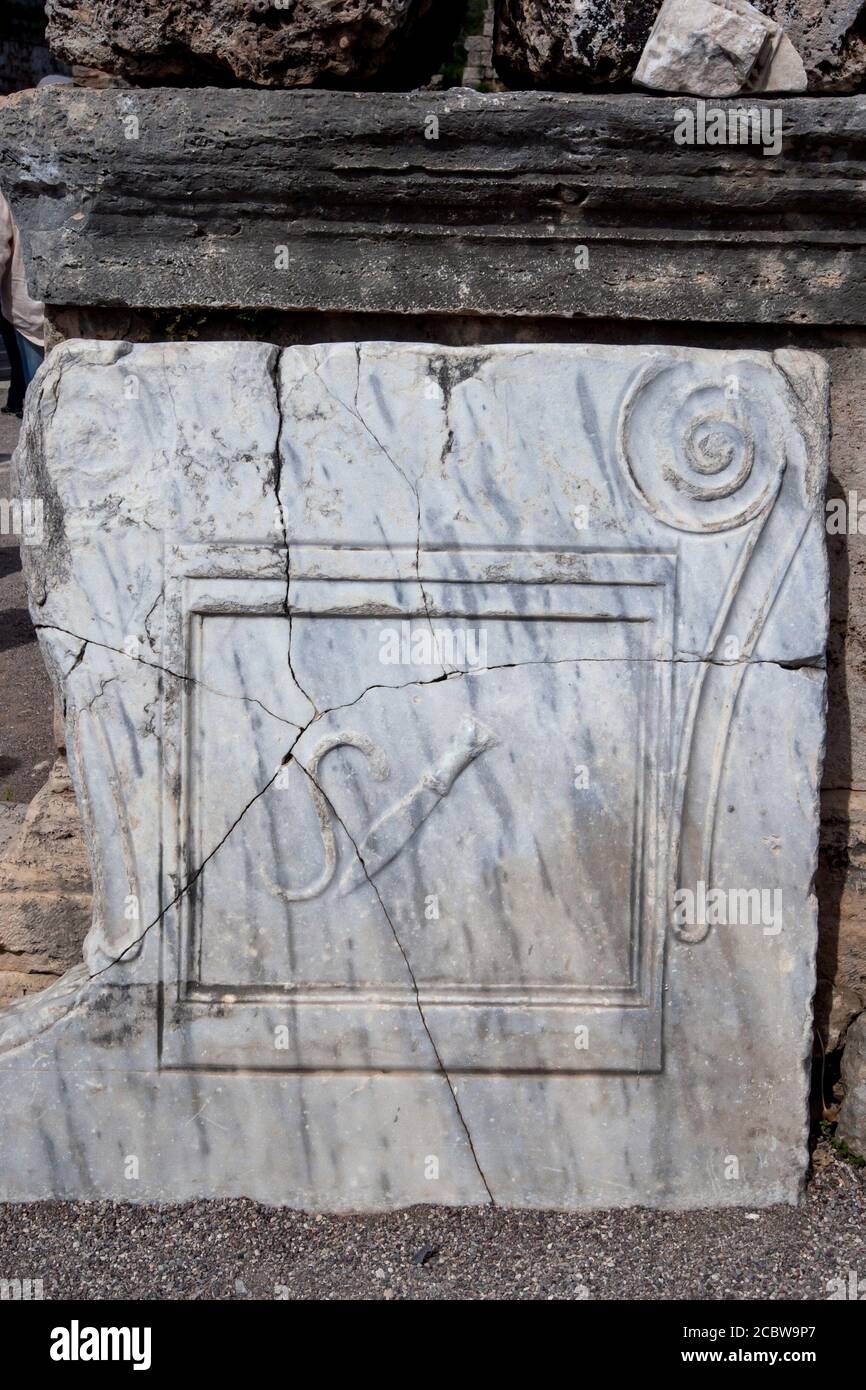 An knife inscription on a white marble stone indicating the location of ...