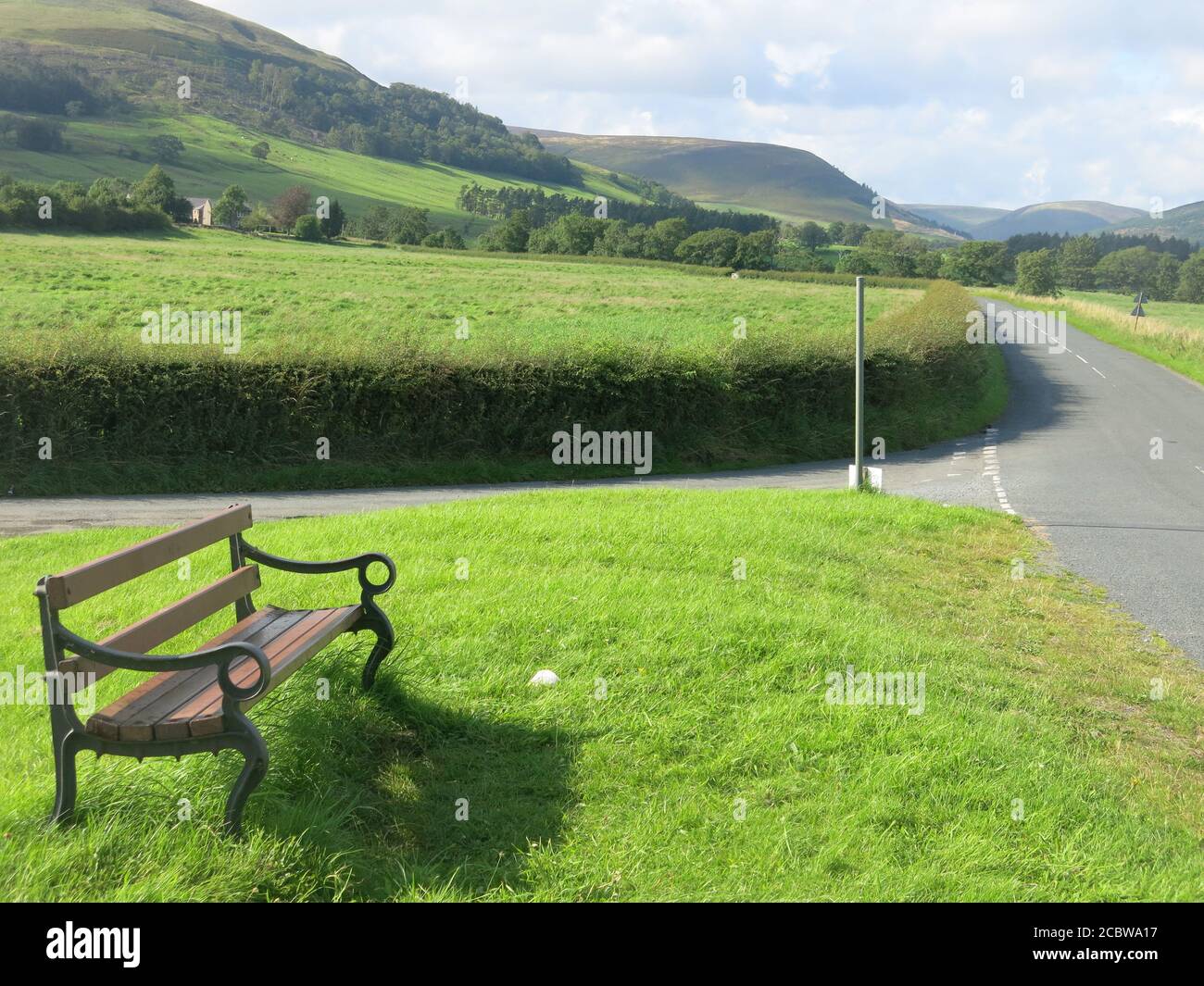A wooden bench is place at the crossroads by the Burholme Bridge to ...