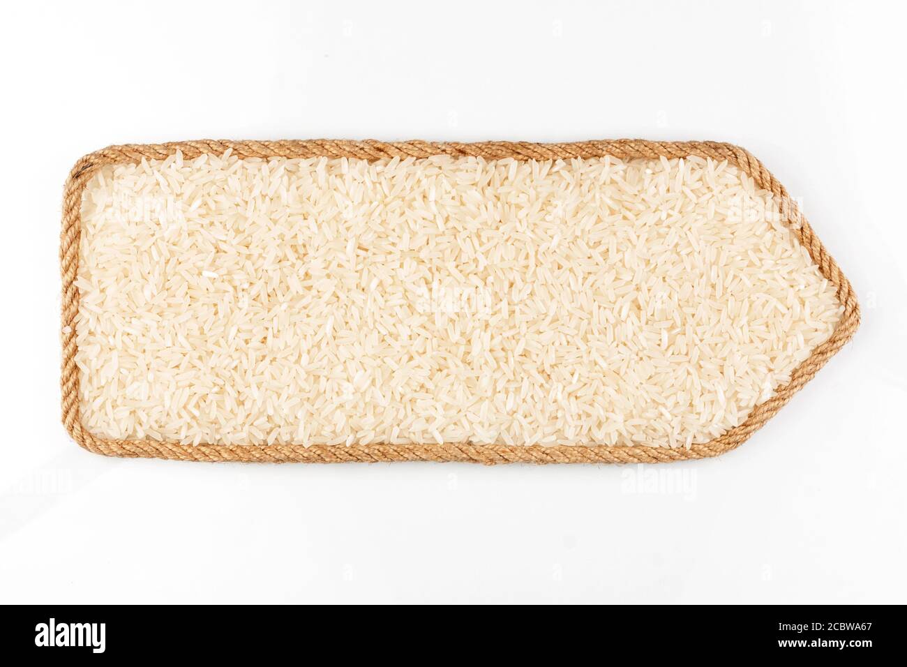 Pointer made of rope, filled with a grain of rice. Isolated on white ...