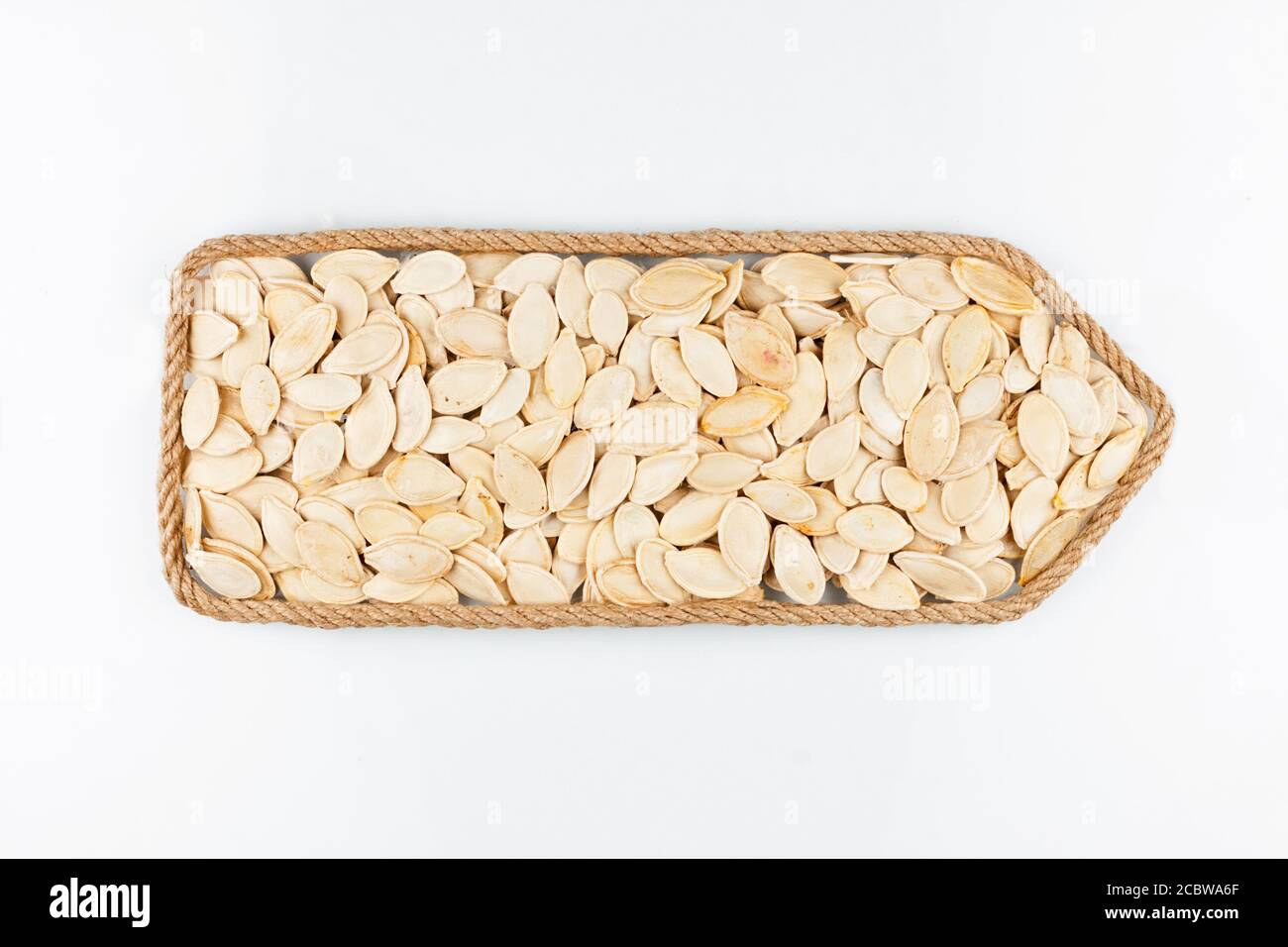 Pointer made of rope, filled with a seed of pumpkin. Isolated on white ...