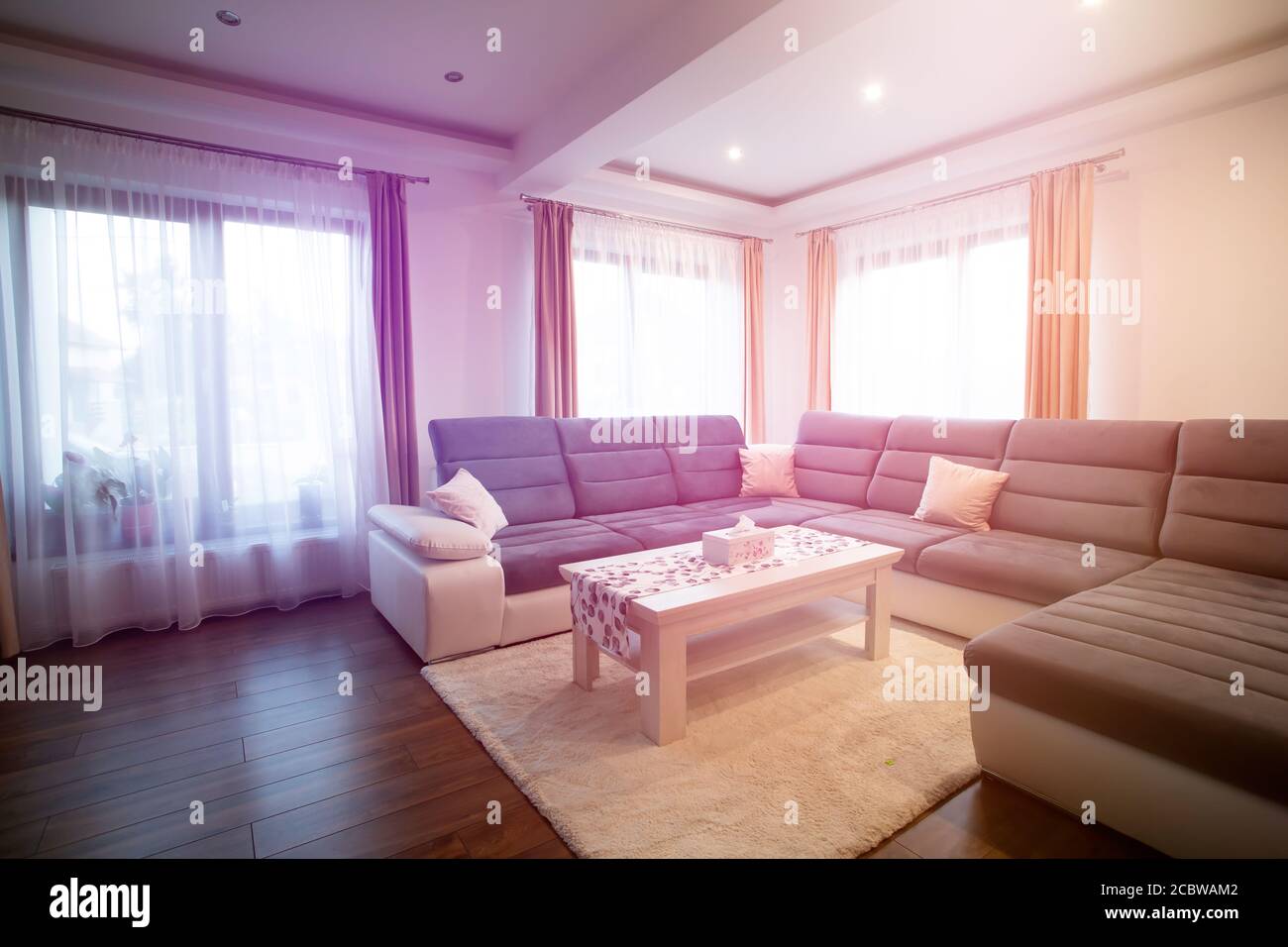 Modern living room interior - wide angle photo Stock Photo - Alamy