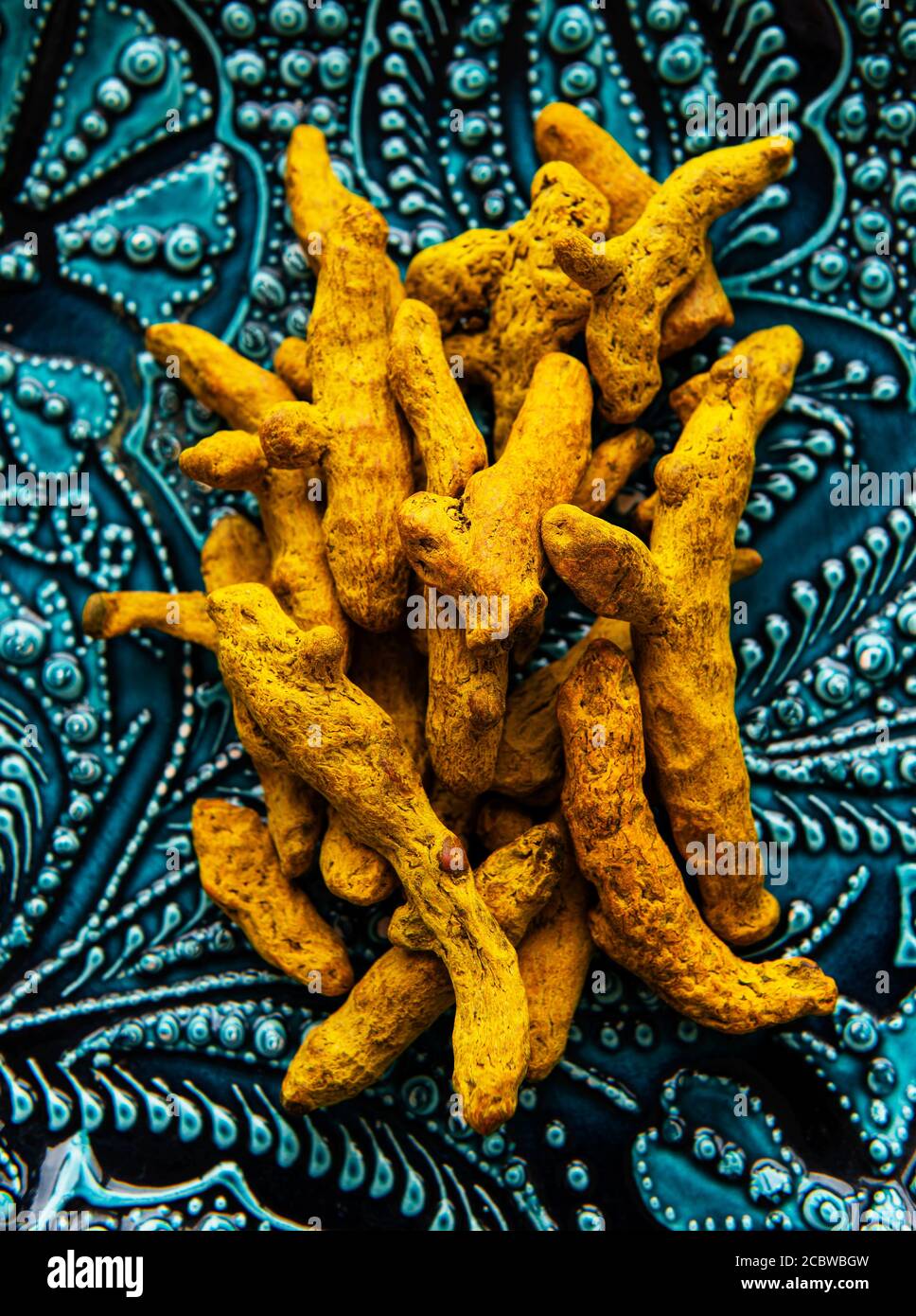Whole dry turmeric roots Stock Photo - Alamy