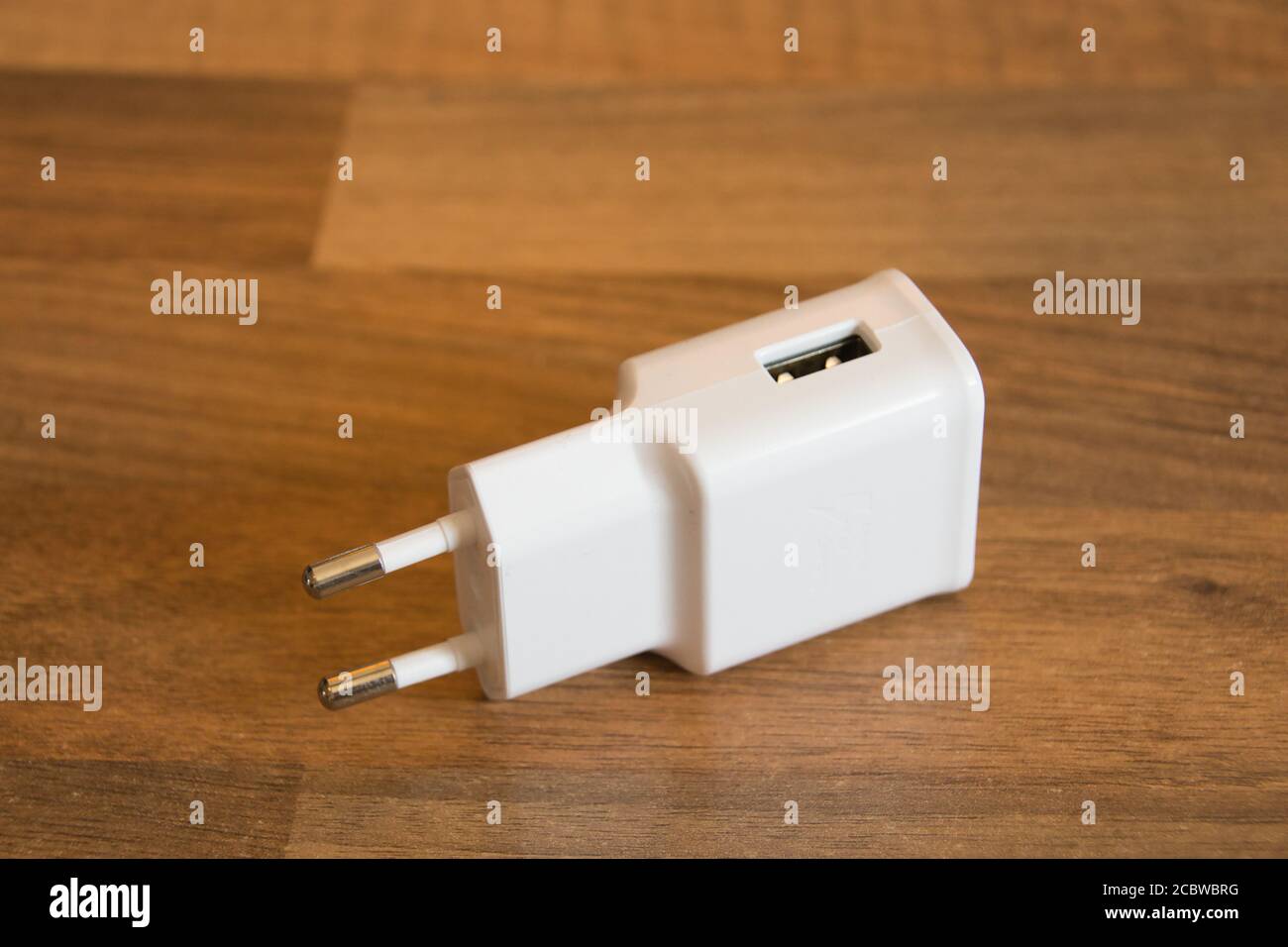 A white Plug Adapter Charger isolated Stock Photo - Alamy