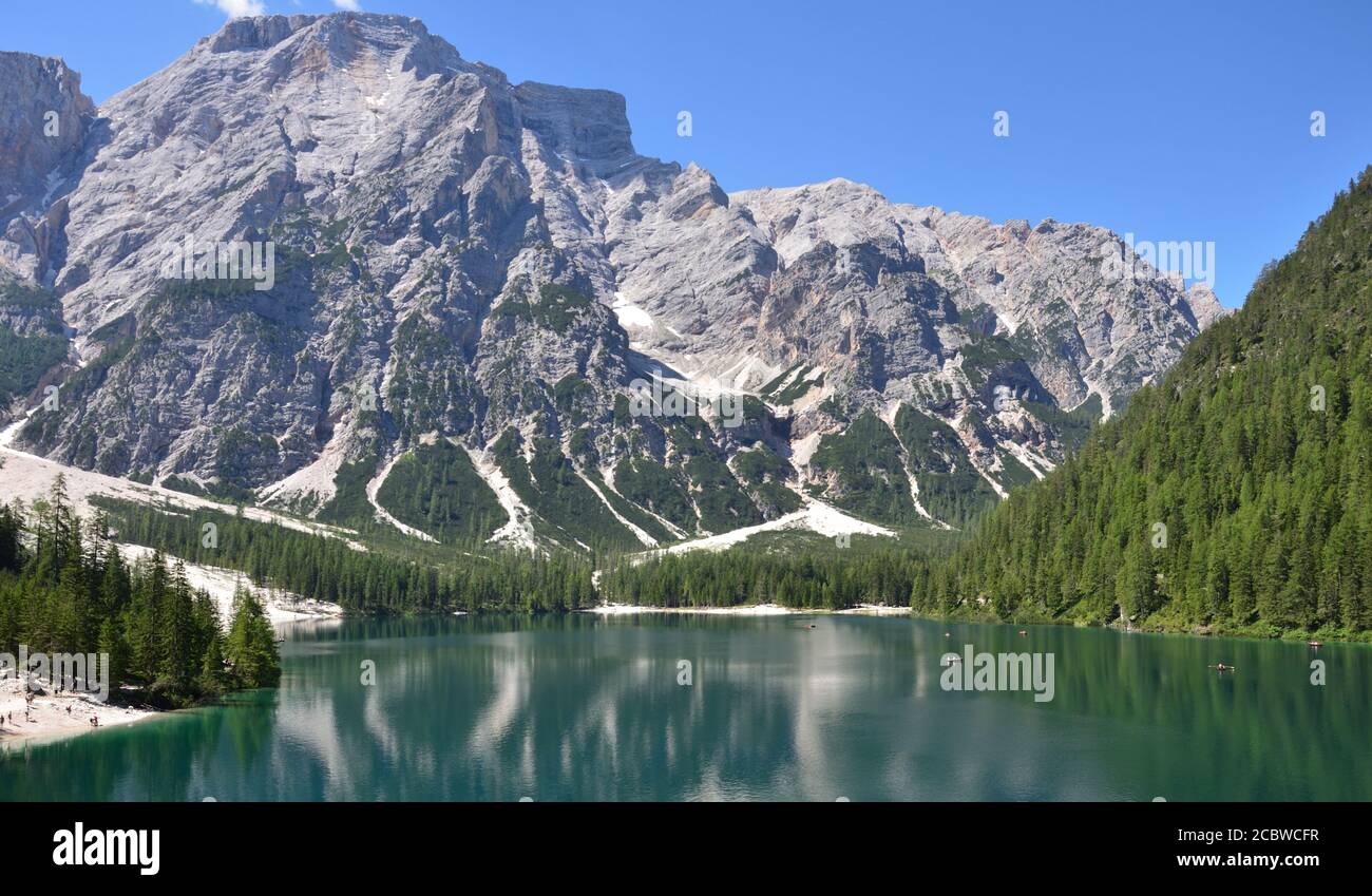 In the upper part of Lake Braies, the large massif of Croda del Becco ...