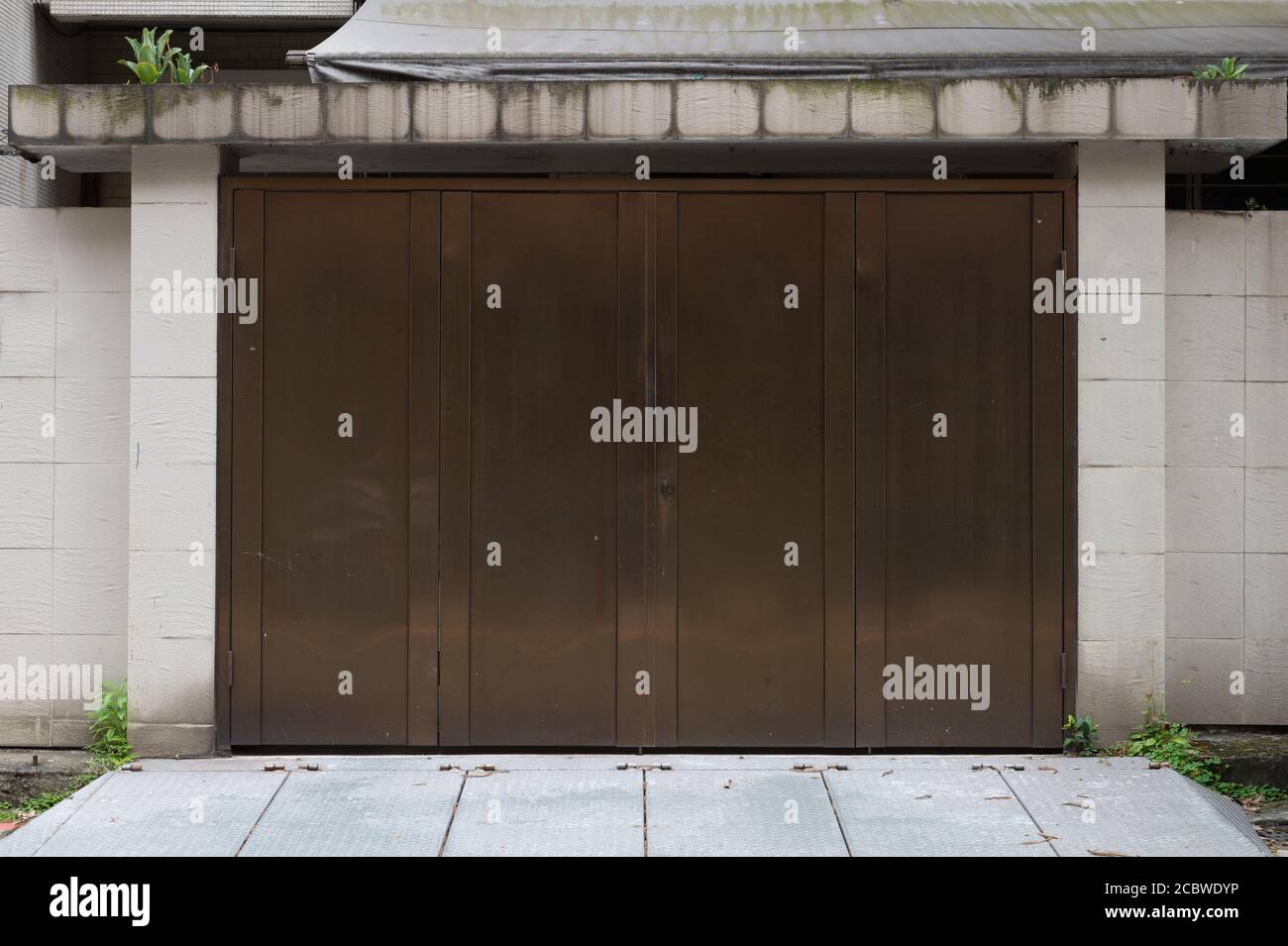 sidewalk by street wall & door Stock Photo - Alamy