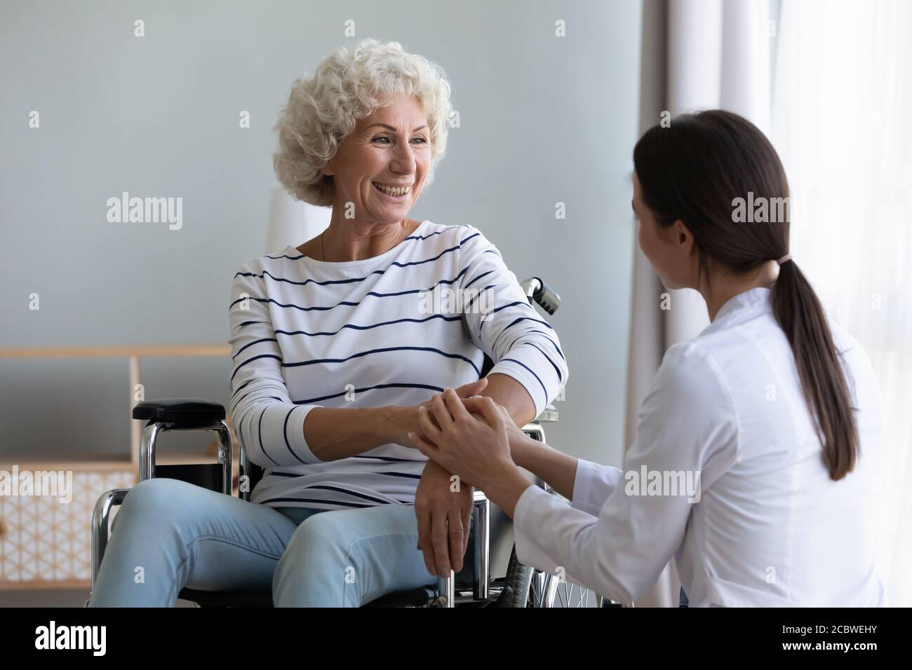 Young physiotherapist woman giving hi-res stock photography and images ...